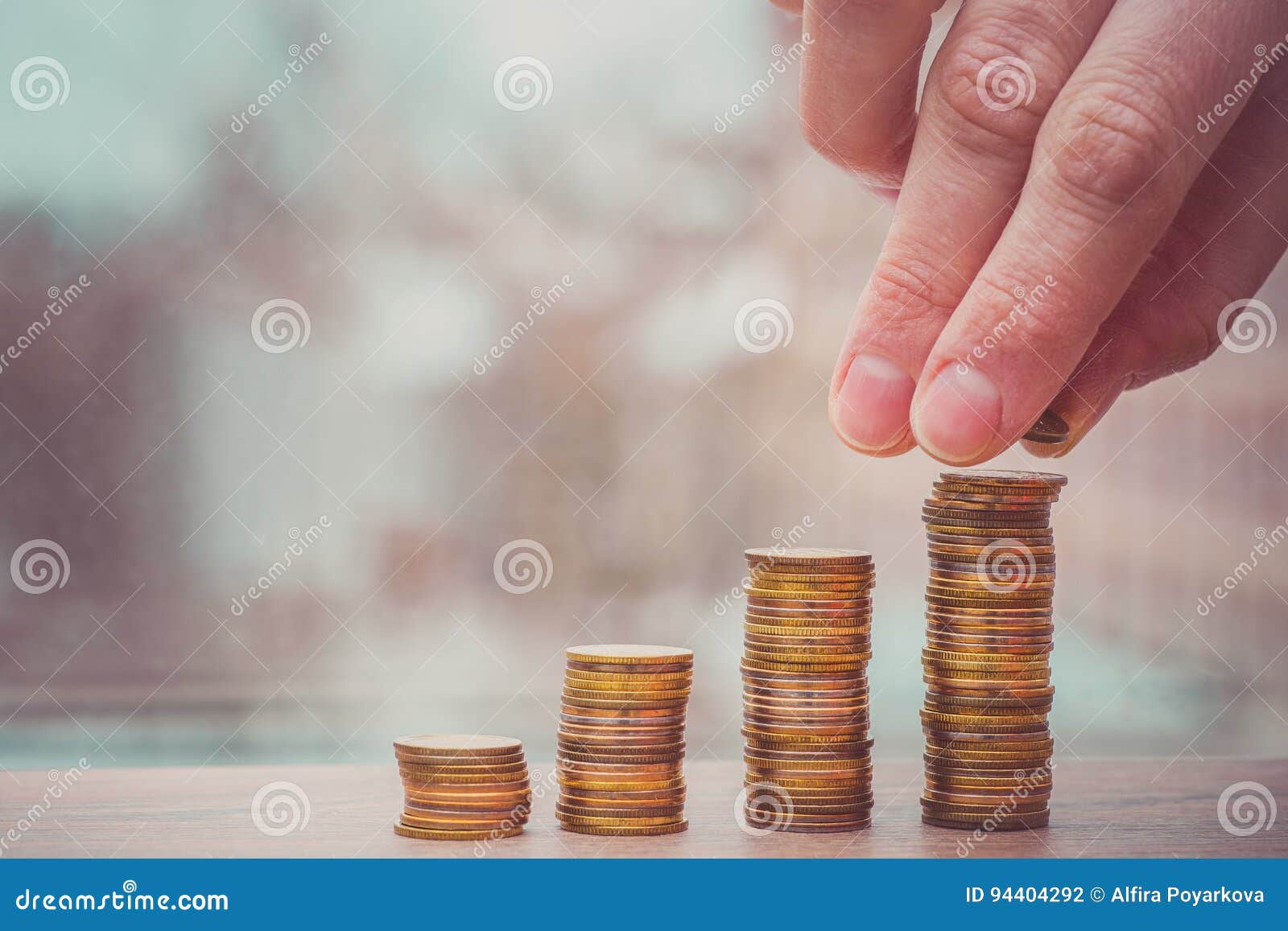 Rising graph made of coins stock photo. Image of black - 94404292
