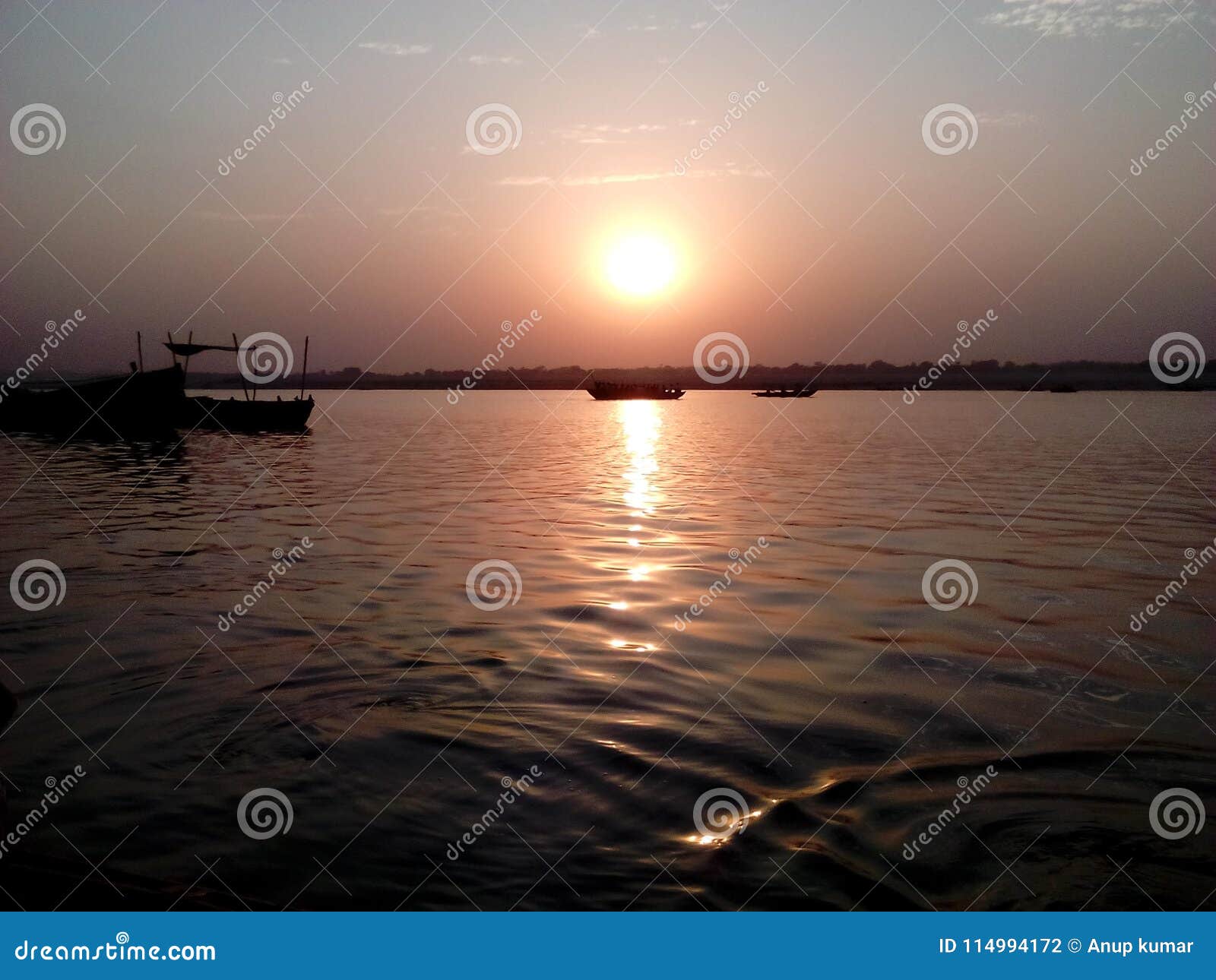 Rising of sun stock photo. Image of river, rising, ganga - 114994172