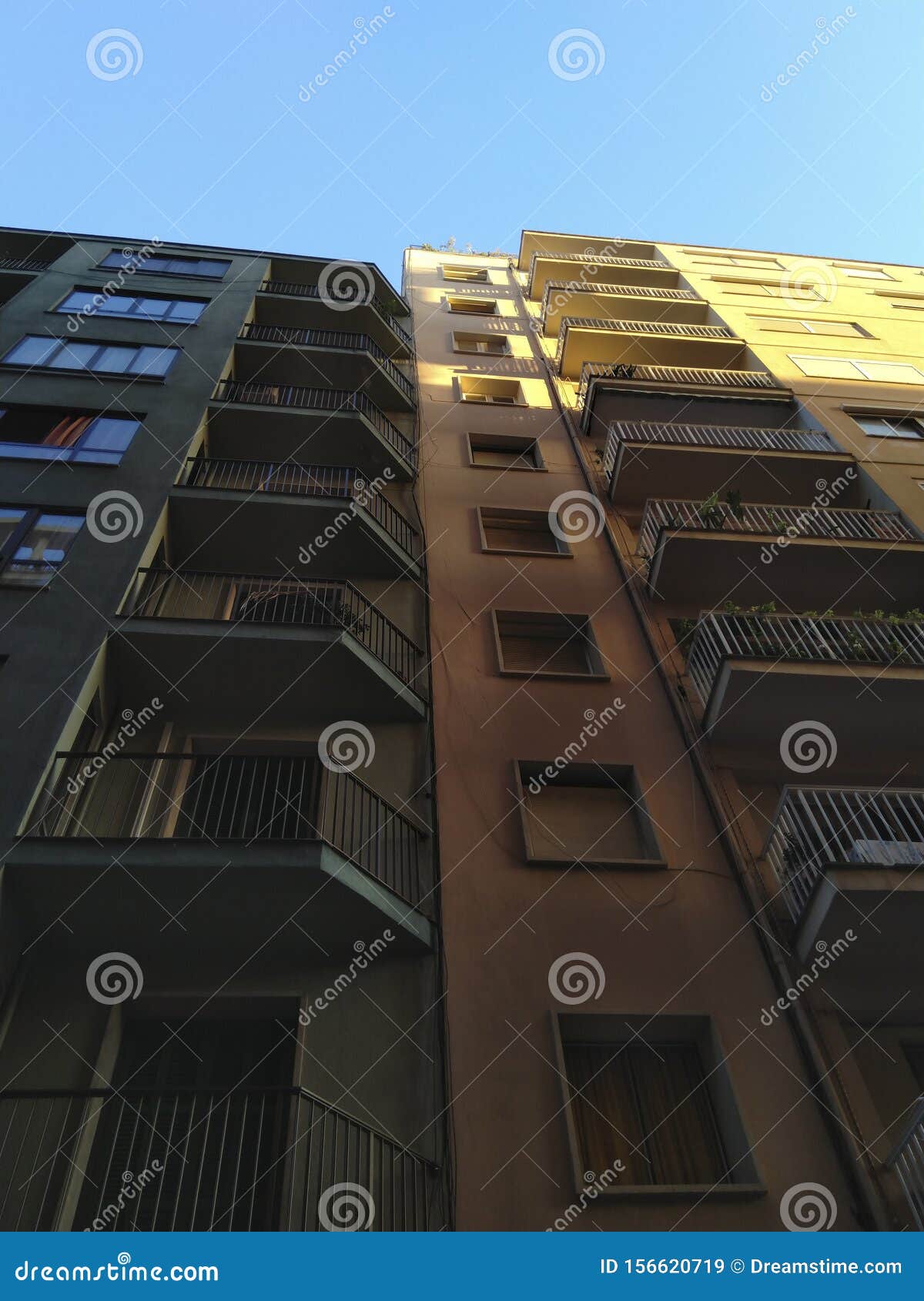 Rising sun in the city stock image. Image of building - 156620719