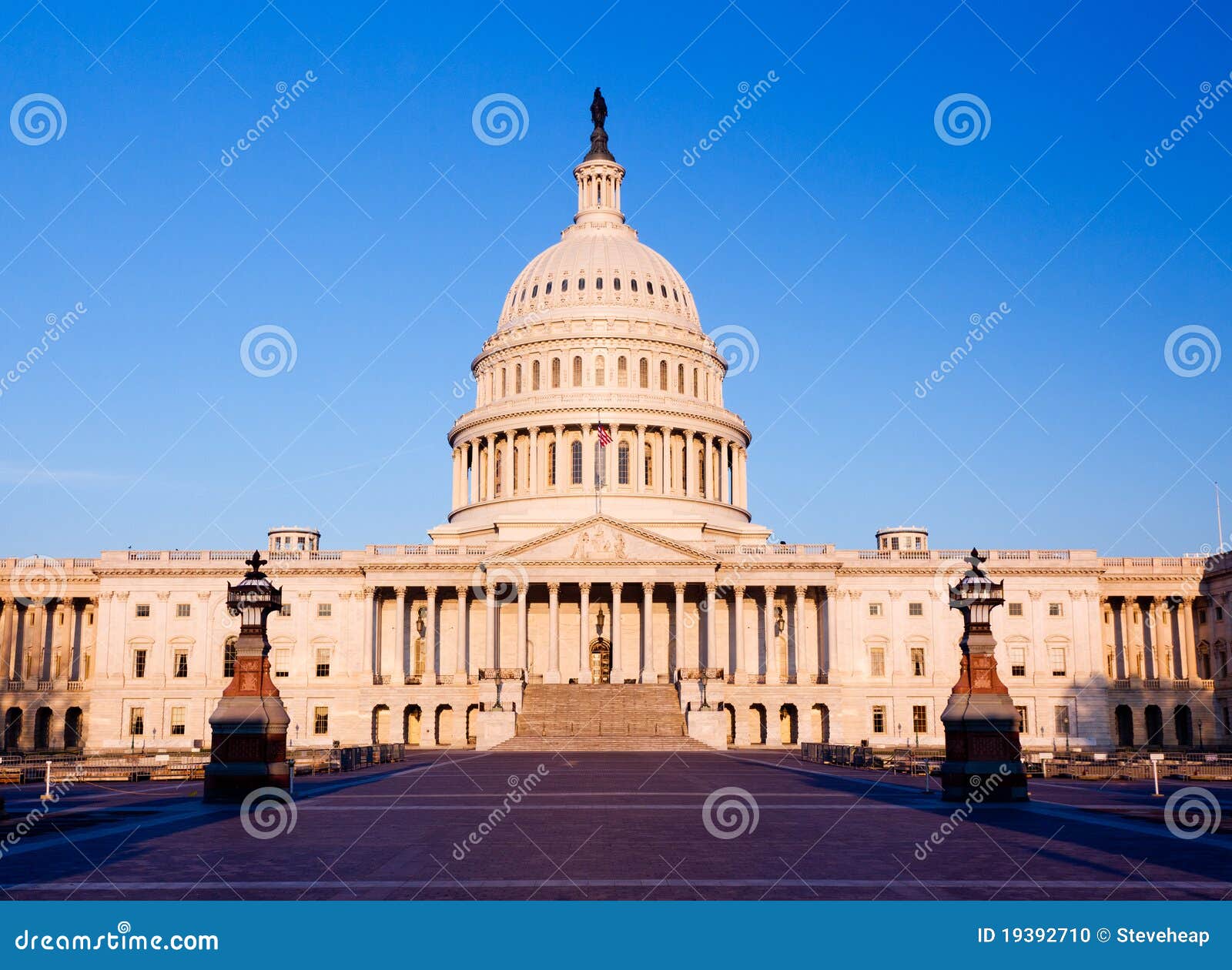 Rising Sun Illuminates the Front of Capitol Stock Photo - Image of ...