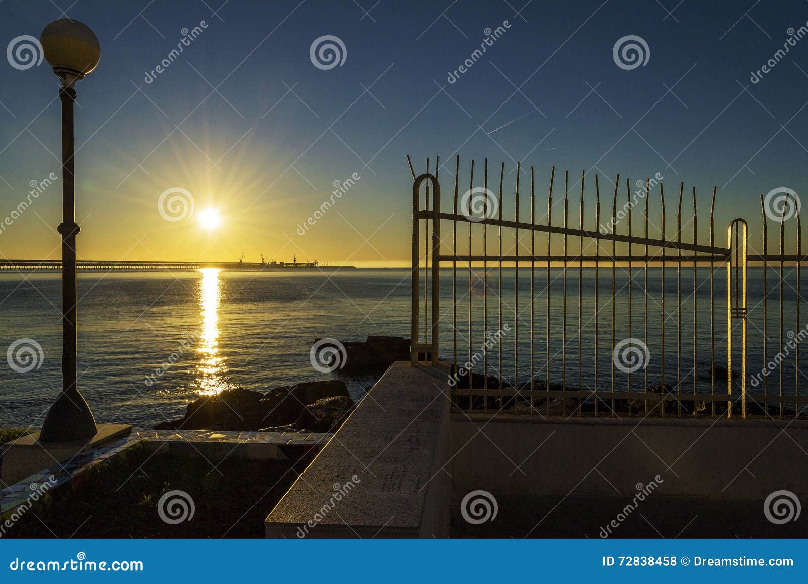Rising sun whit rays stock photo. Image of seascape, landscape - 72838458