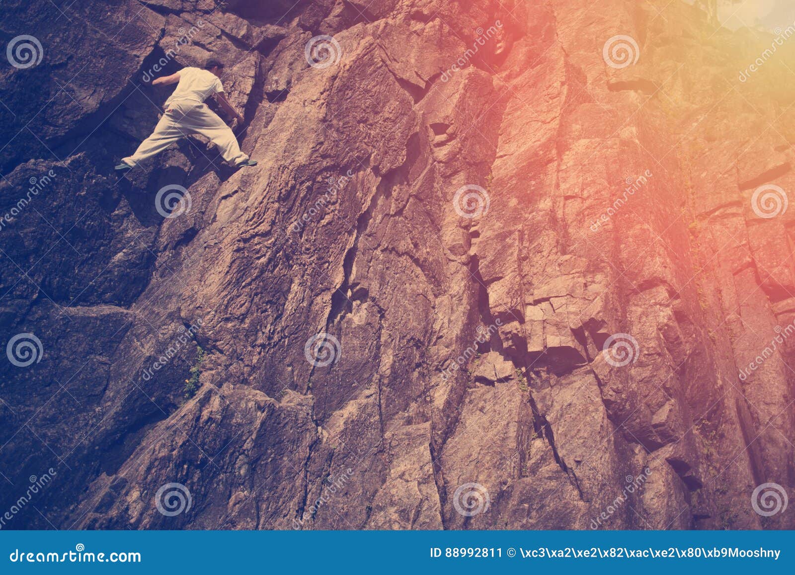 Risky Man Climbing Over Danger Mountain without Any Rope Stock Image ...