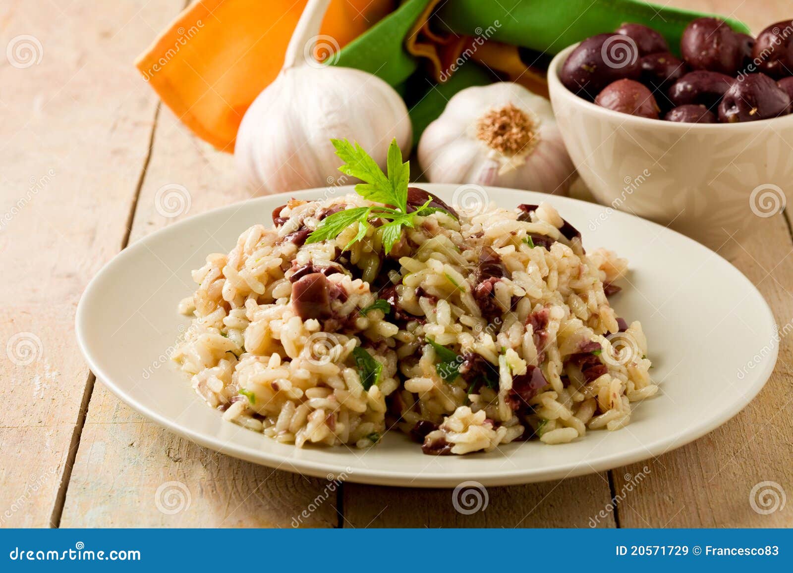 Risotto with Black Olives on Wooden Table Stock Image - Image of good ...
