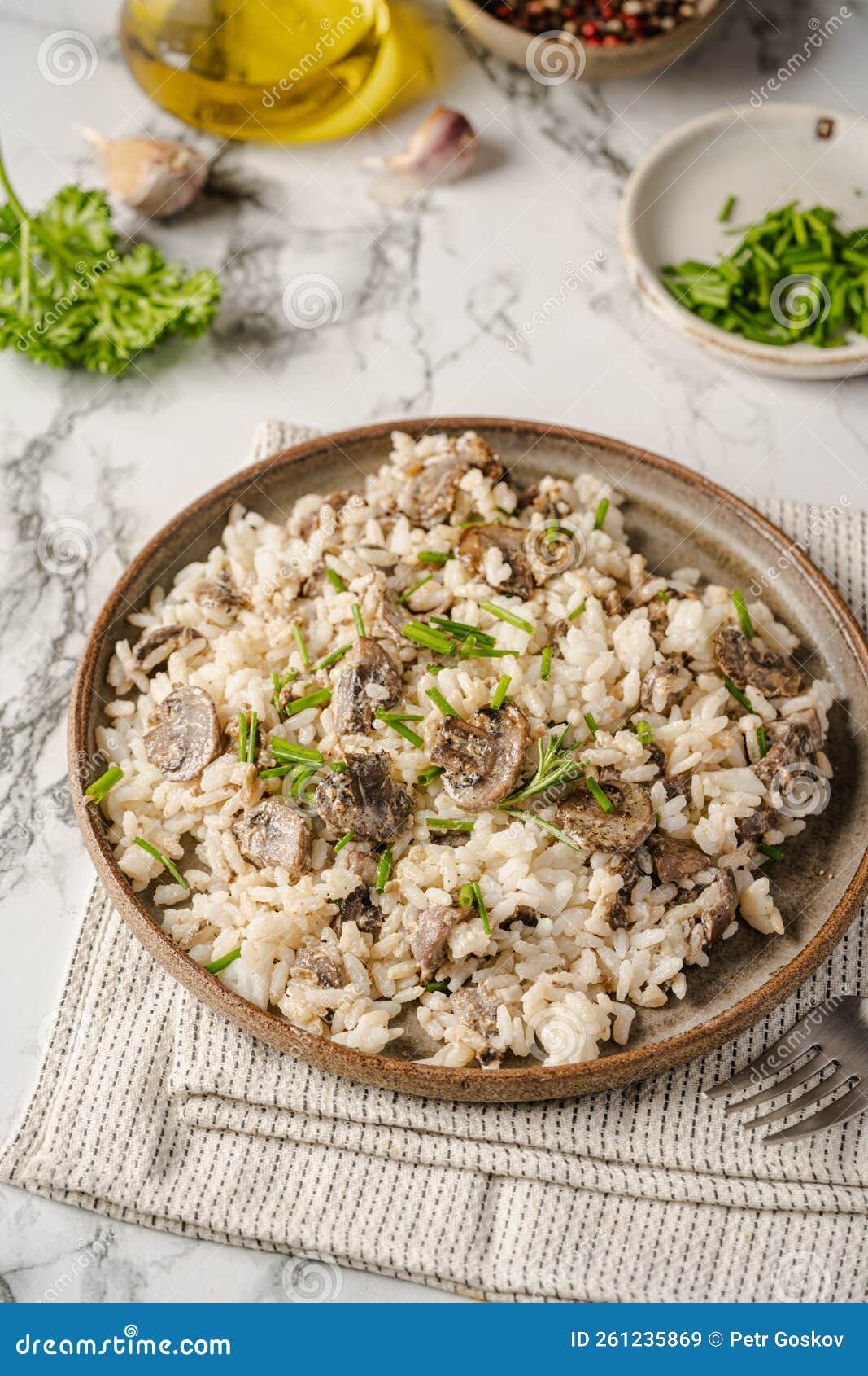 Risotto with mushrooms stock image. Image of parsley - 261235869