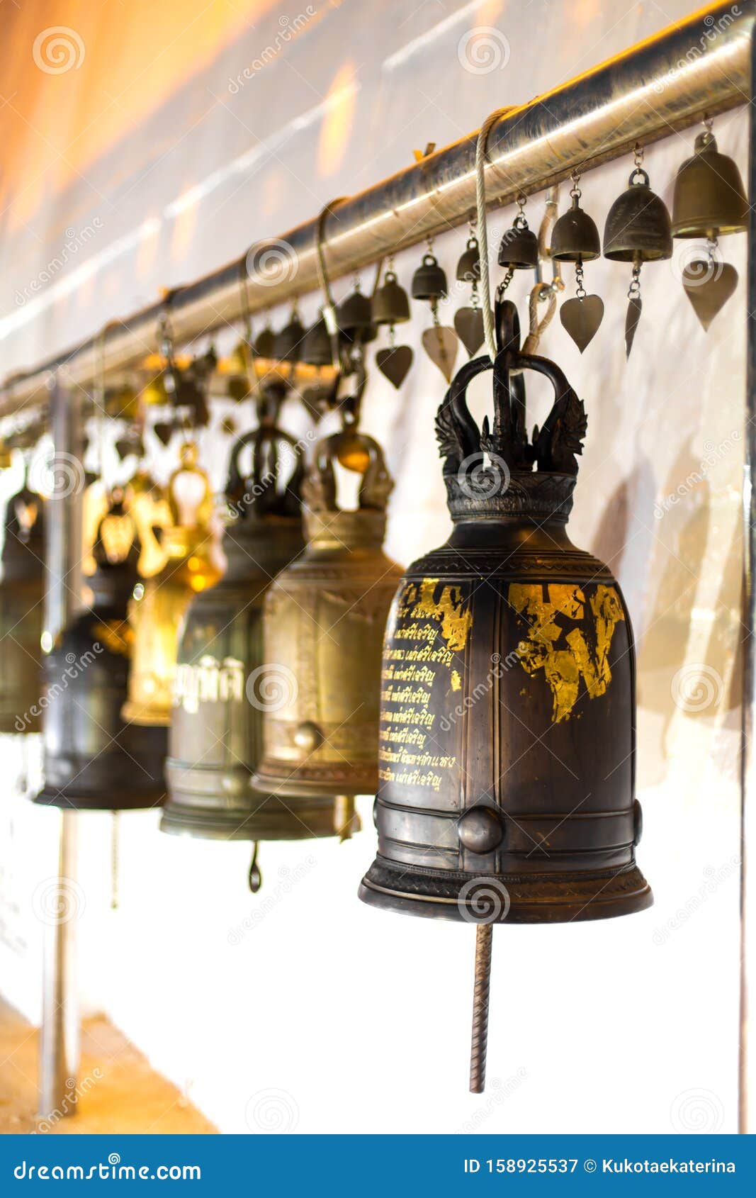 Ritual Bells of Different Sizes in a Buddhist Temple Editorial ...