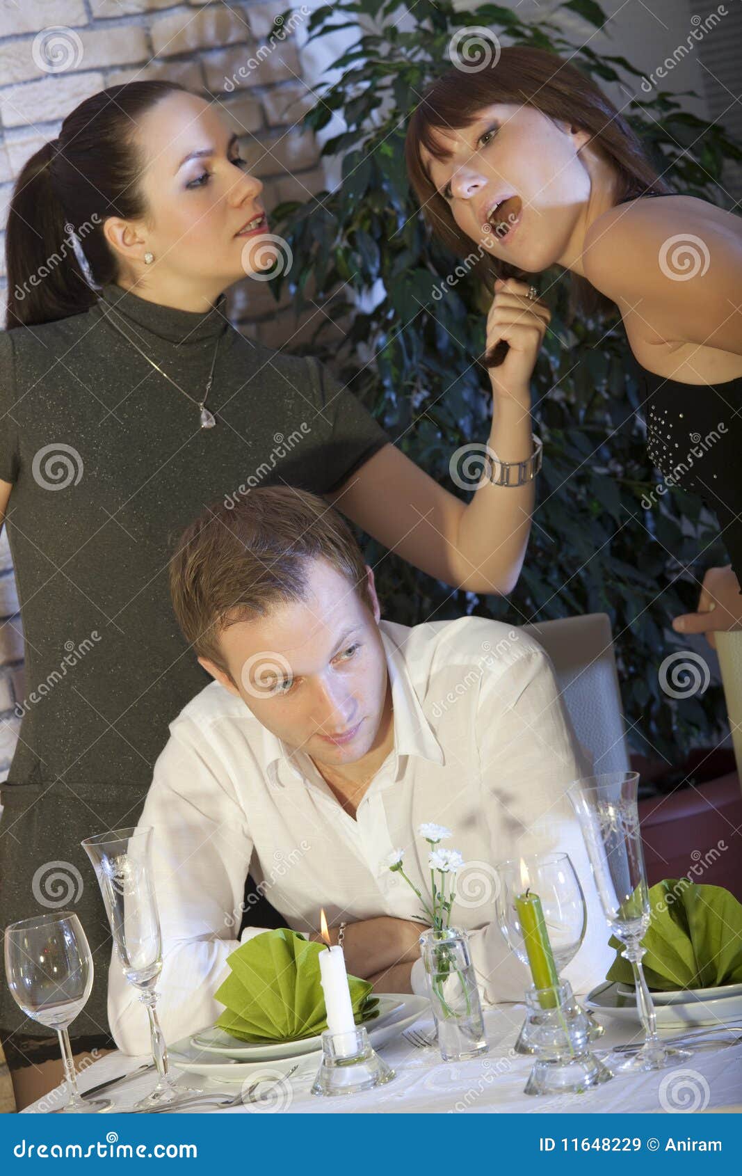 Rivals fighting over man stock image. Image of lover - 11648229