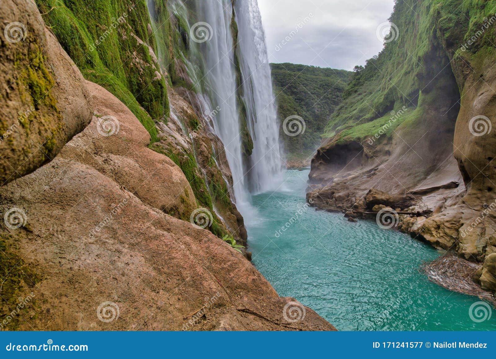 The River and Amazing Blue Tamul Waterfall Stock Image - Image of boat ...