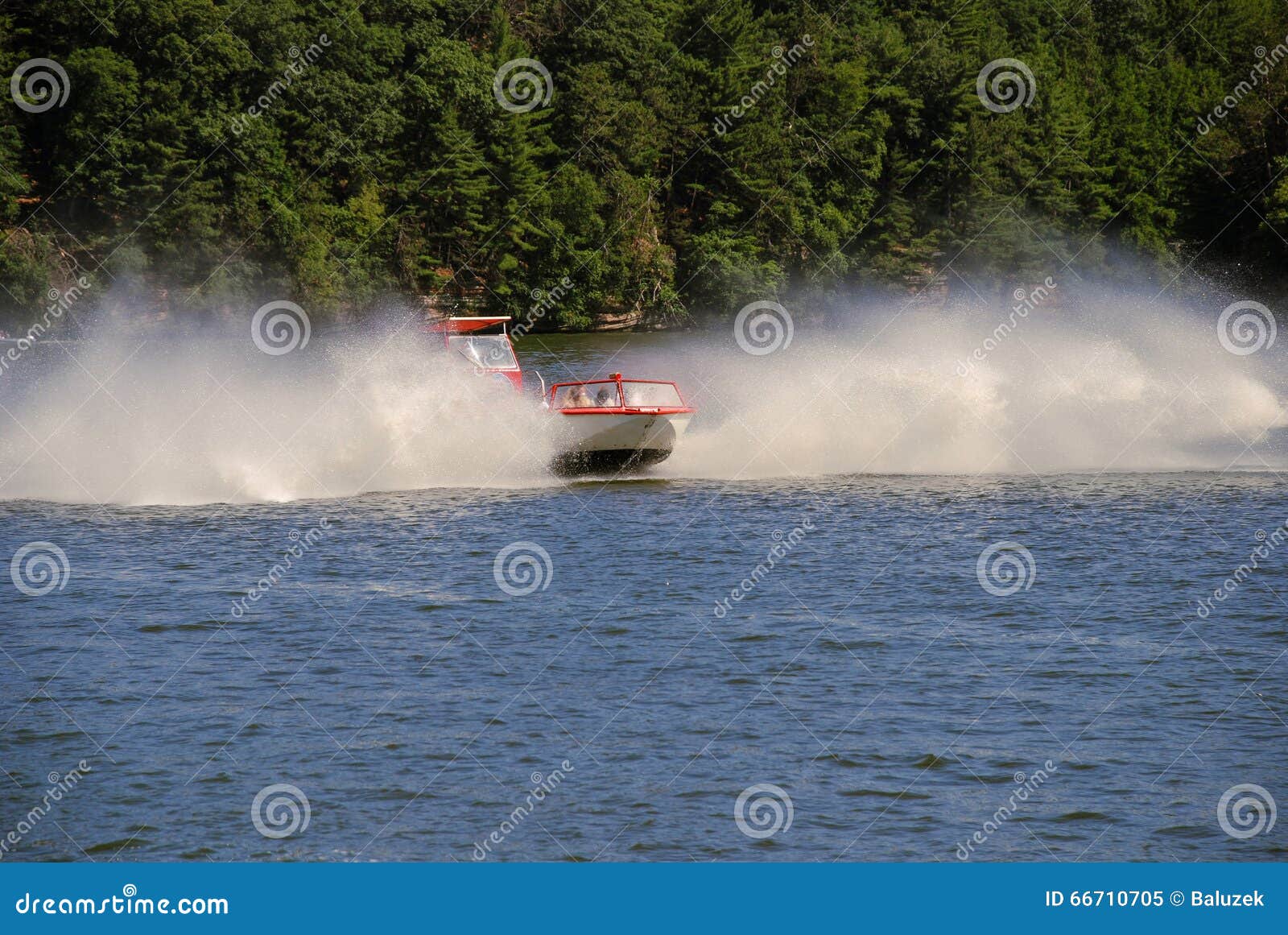 River boat makes a U-turn stock image. Image of forest - 66710705