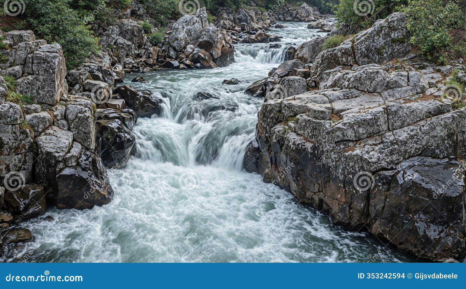 A River Carving Through A Canyon With Towering Hoodoos. Landscape ...
