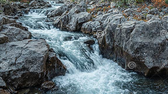 River Carving through Rock Symbolizing Persistence Stock Illustration ...