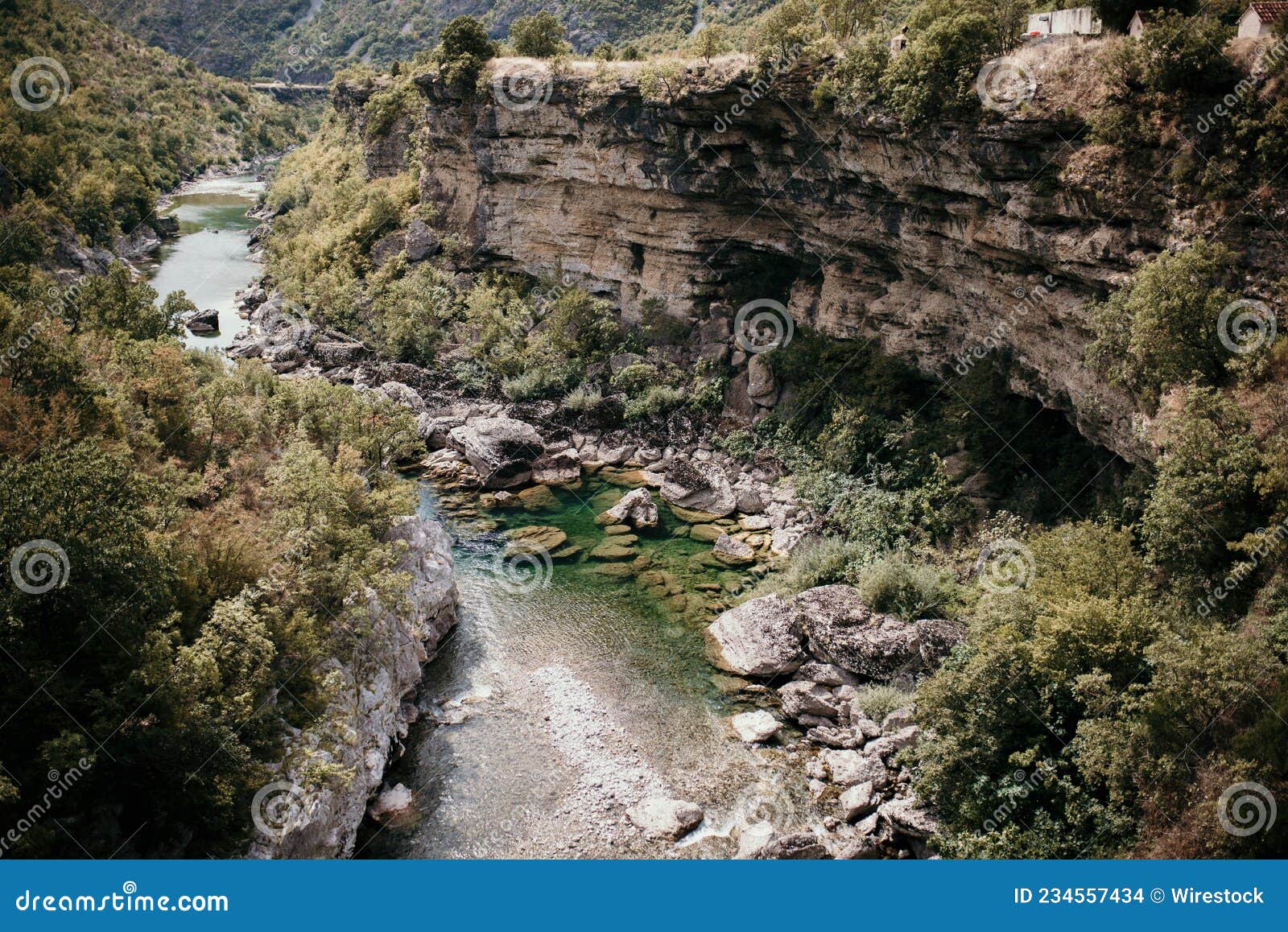 River between Cliffs Covered in Trees in a Mountainous Area Stock Photo ...