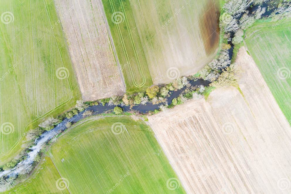 A River between Crop Fields in Spring, Overhead Drone View Stock Image ...