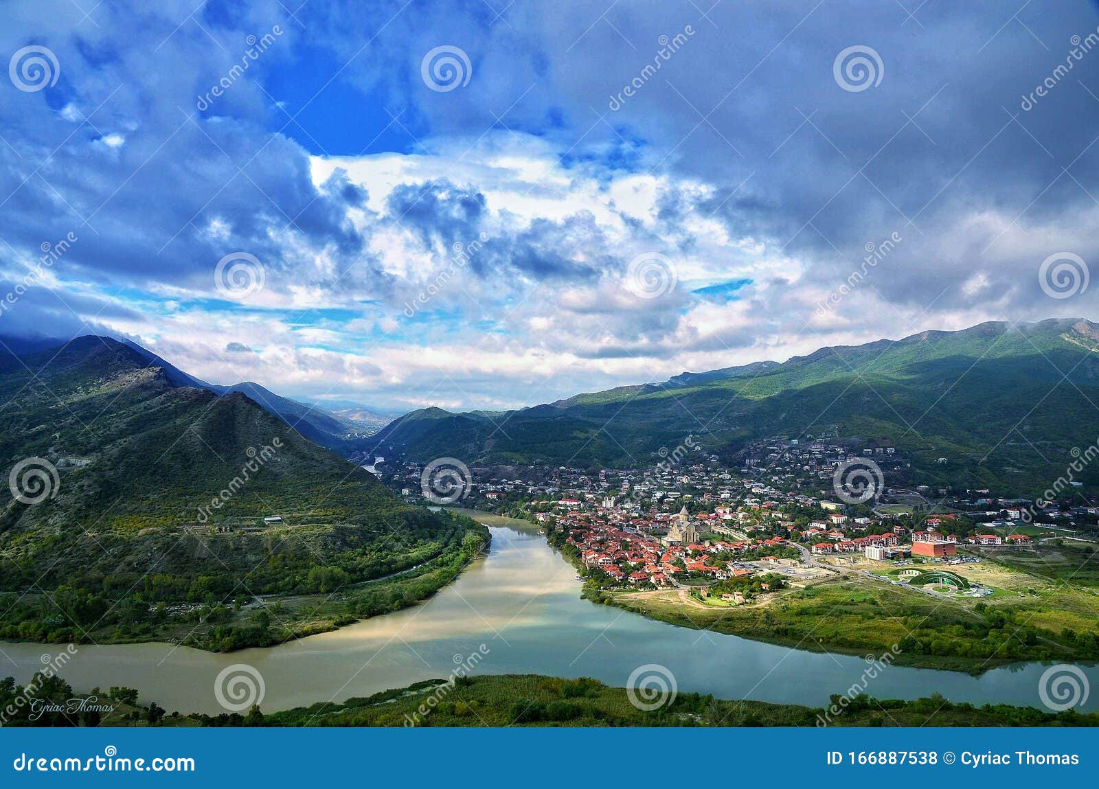 River Dividing a Township and Mountains Stock Photo - Image of ...