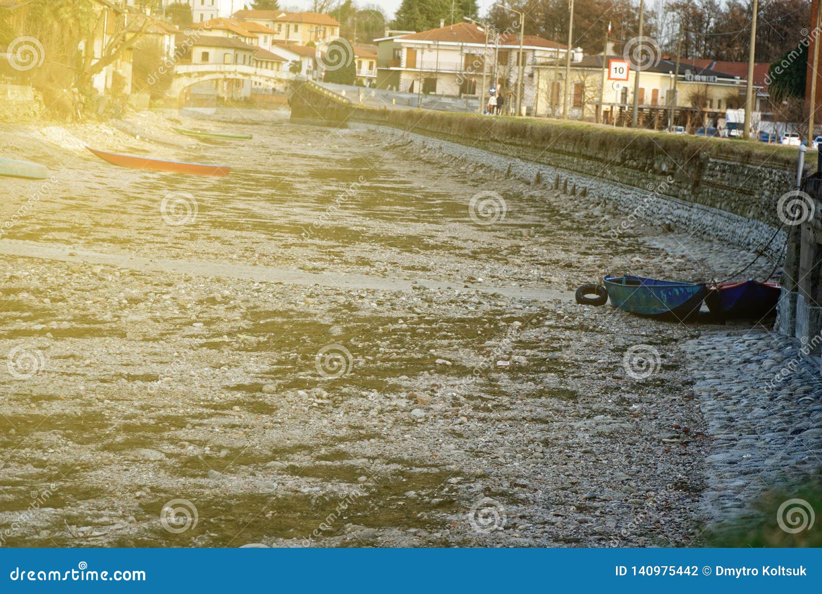 River Drought, Blue Boat without Water Due Global Warming Stock Photo ...