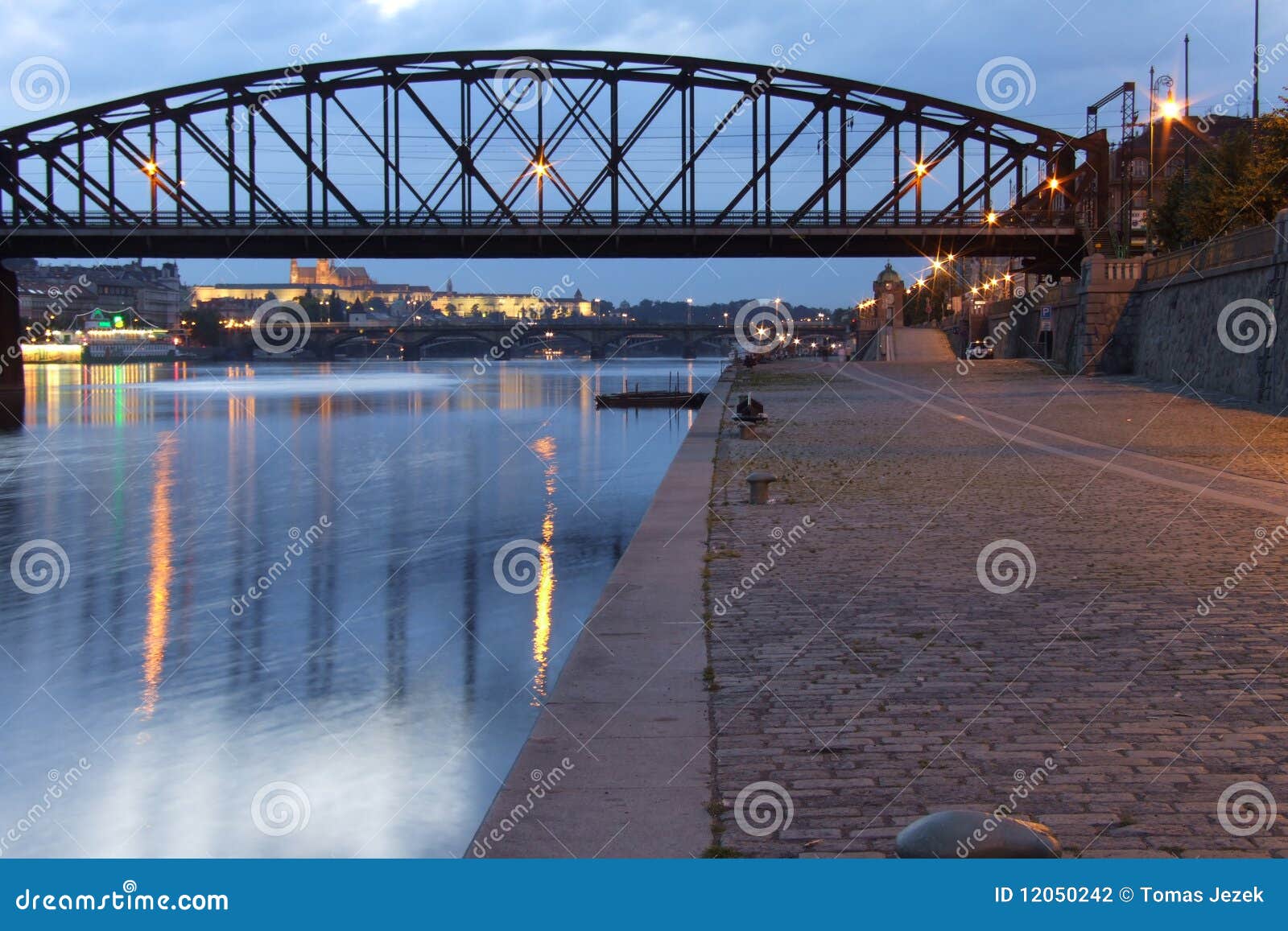 River embankment at dusk stock photo. Image of skyline - 12050242