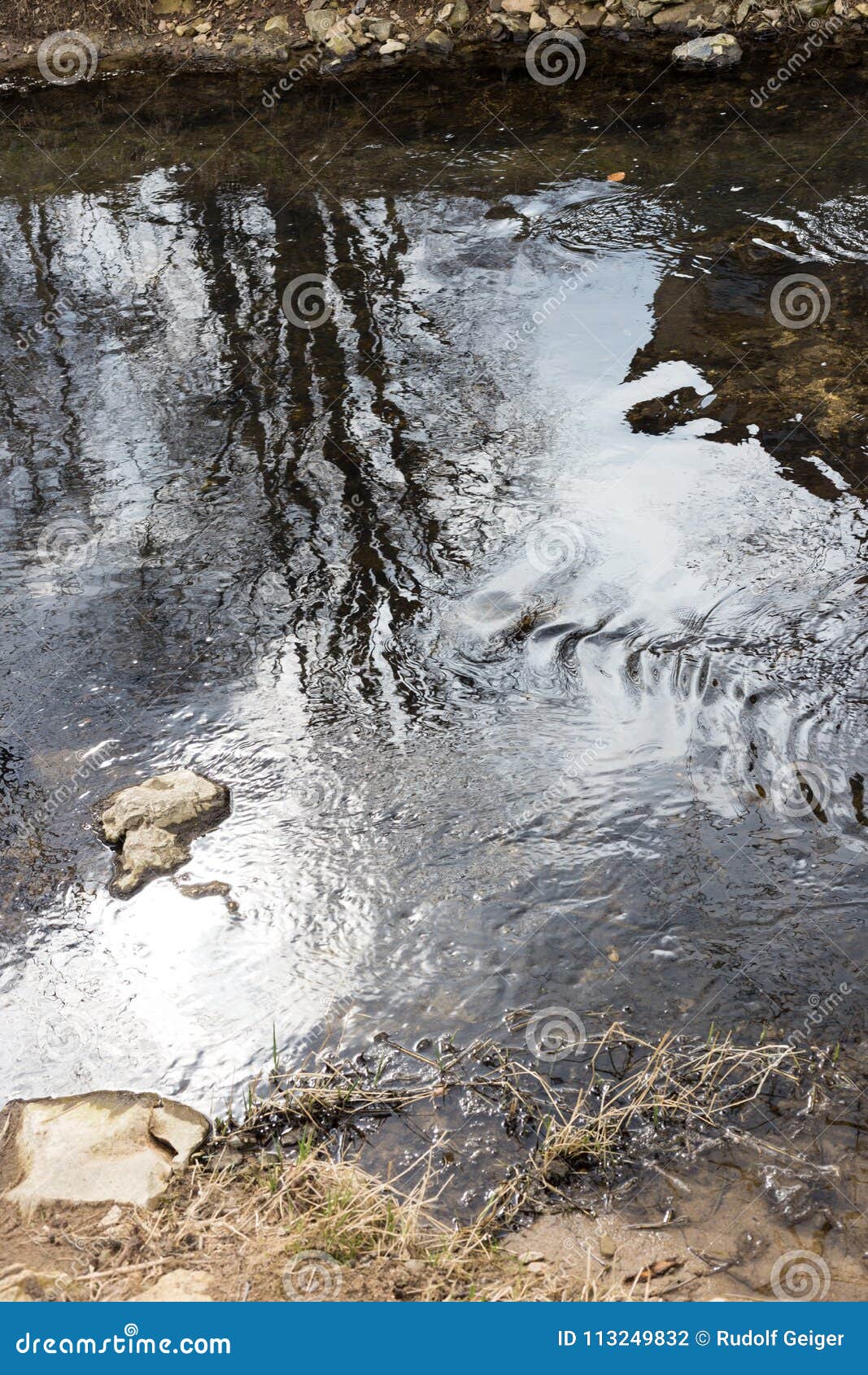 River Floating Surface View with Mirroring Objects and Tiny Wave Stock ...