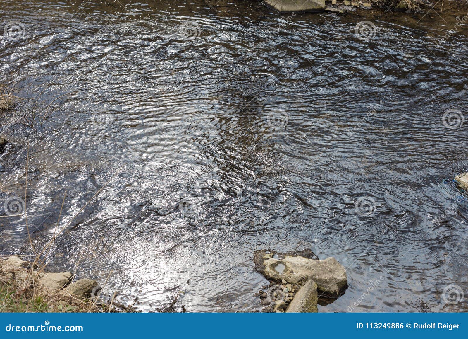 River Floating Surface View with Mirroring Objects and Tiny Wave Stock ...