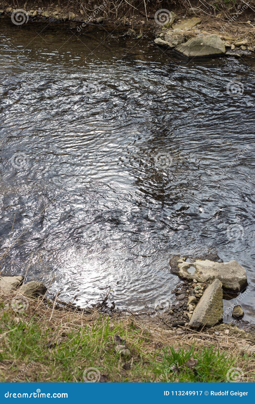 River Floating Surface View with Mirroring Objects and Tiny Wave Stock ...