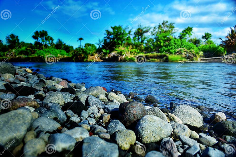 River Flow with Rocks Along Its Flow Stock Image - Image of wave, rock ...