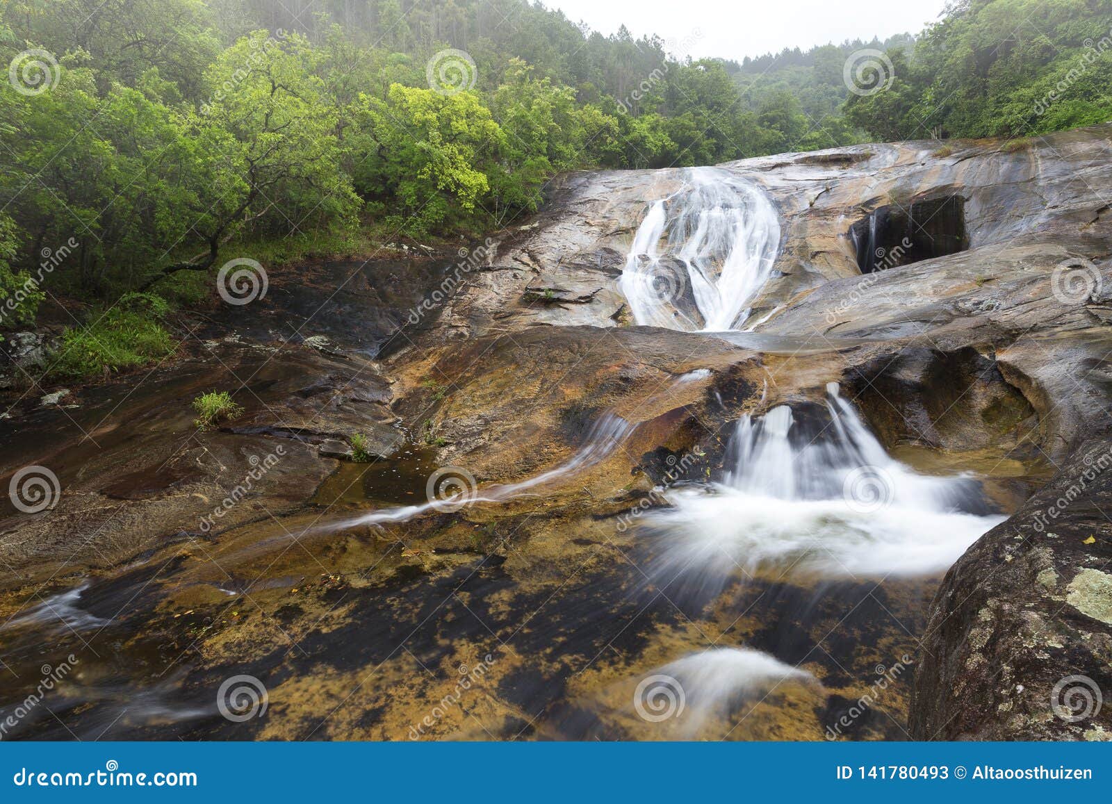 River Flowing Over Rocks and the Debengeni Waterfall Stock Image ...