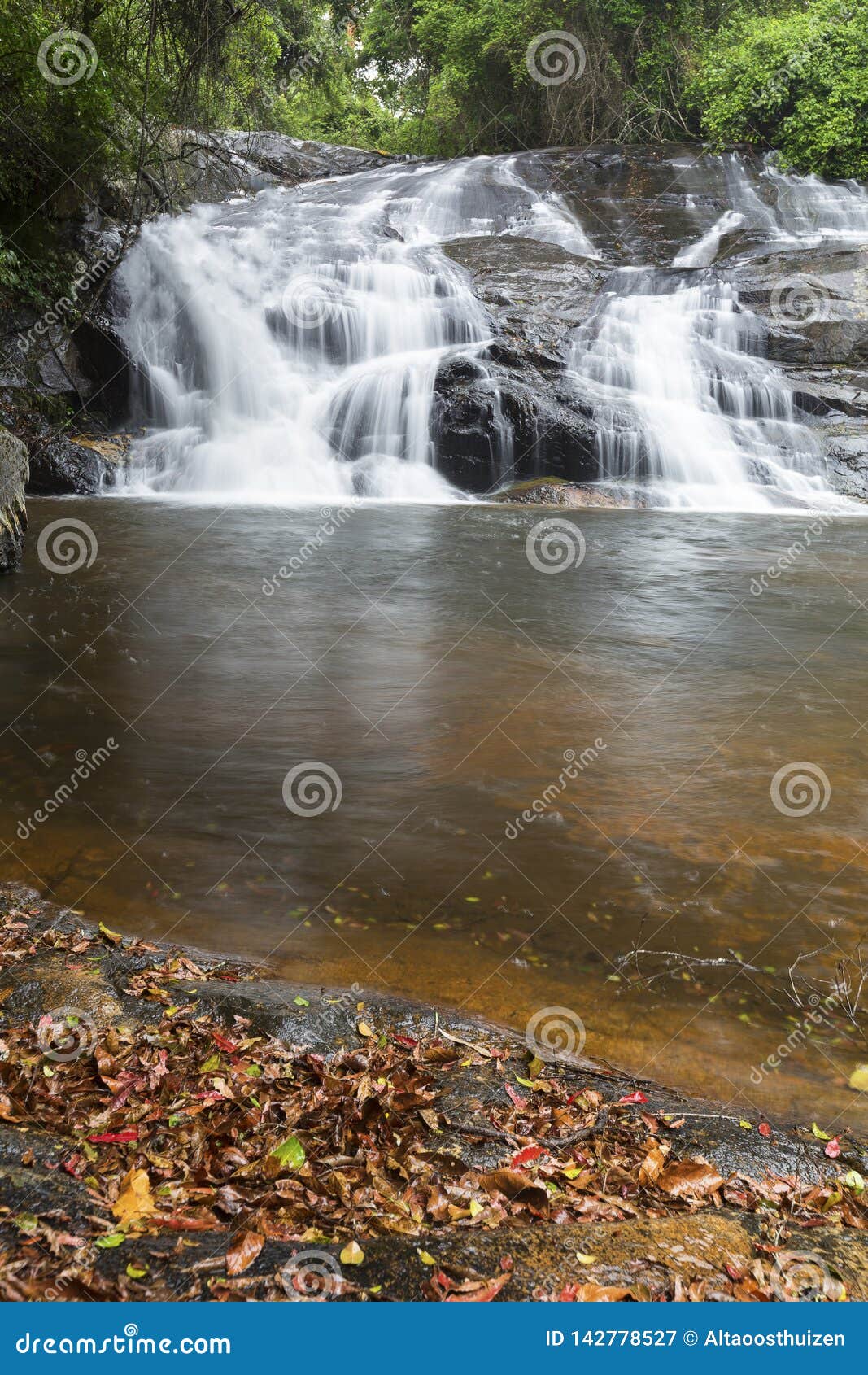 River Flowing Over Rocks and the Debengeni Waterfall Stock Image ...