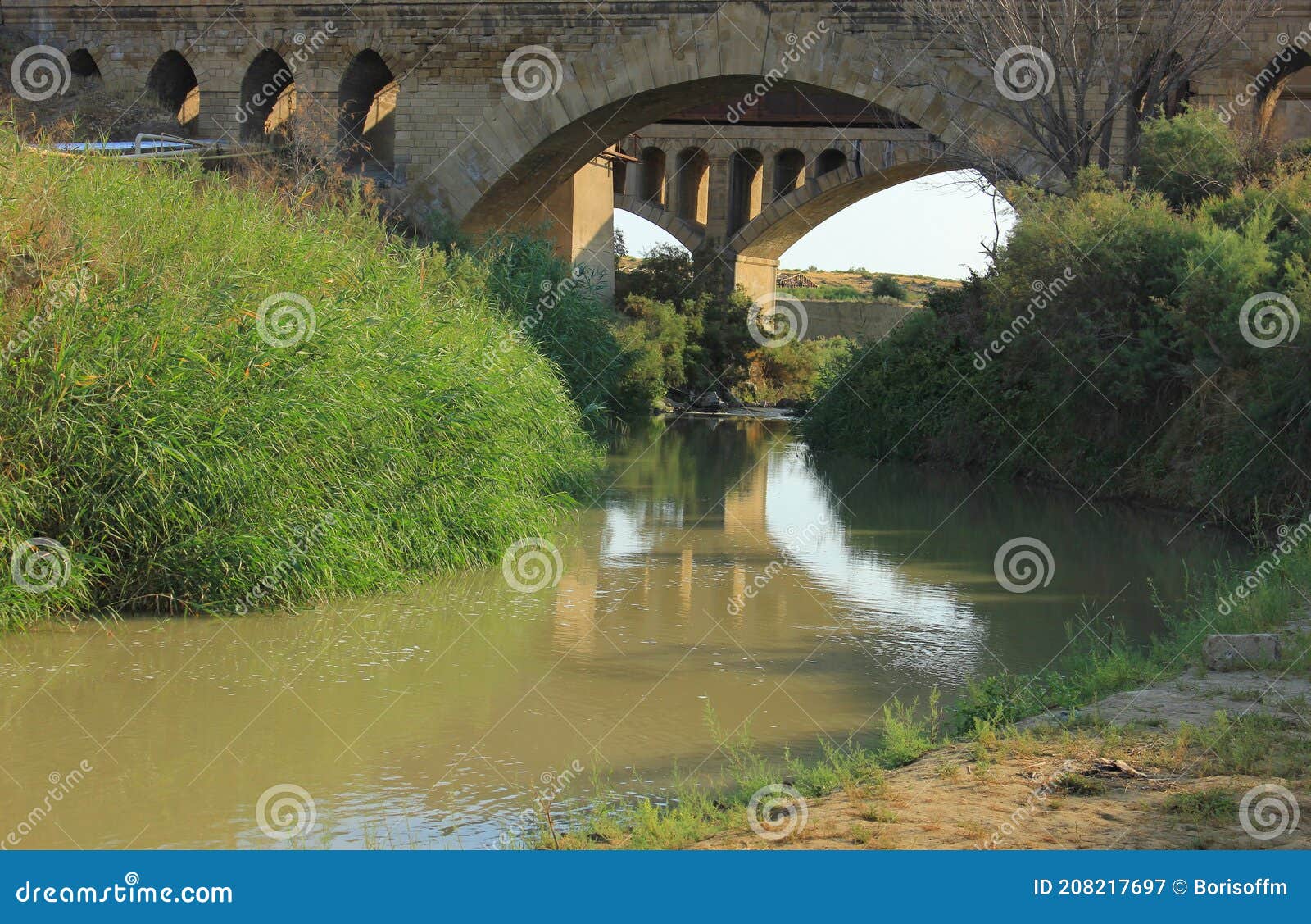 River Flowing Under the Bridge Stock Image - Image of nature, green ...
