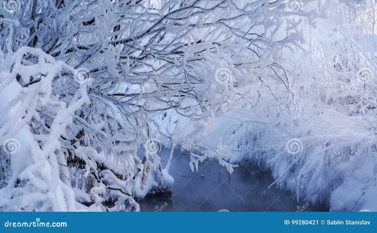 Winter Landscape. River Flows through Snow Drifts and Trees Covered ...