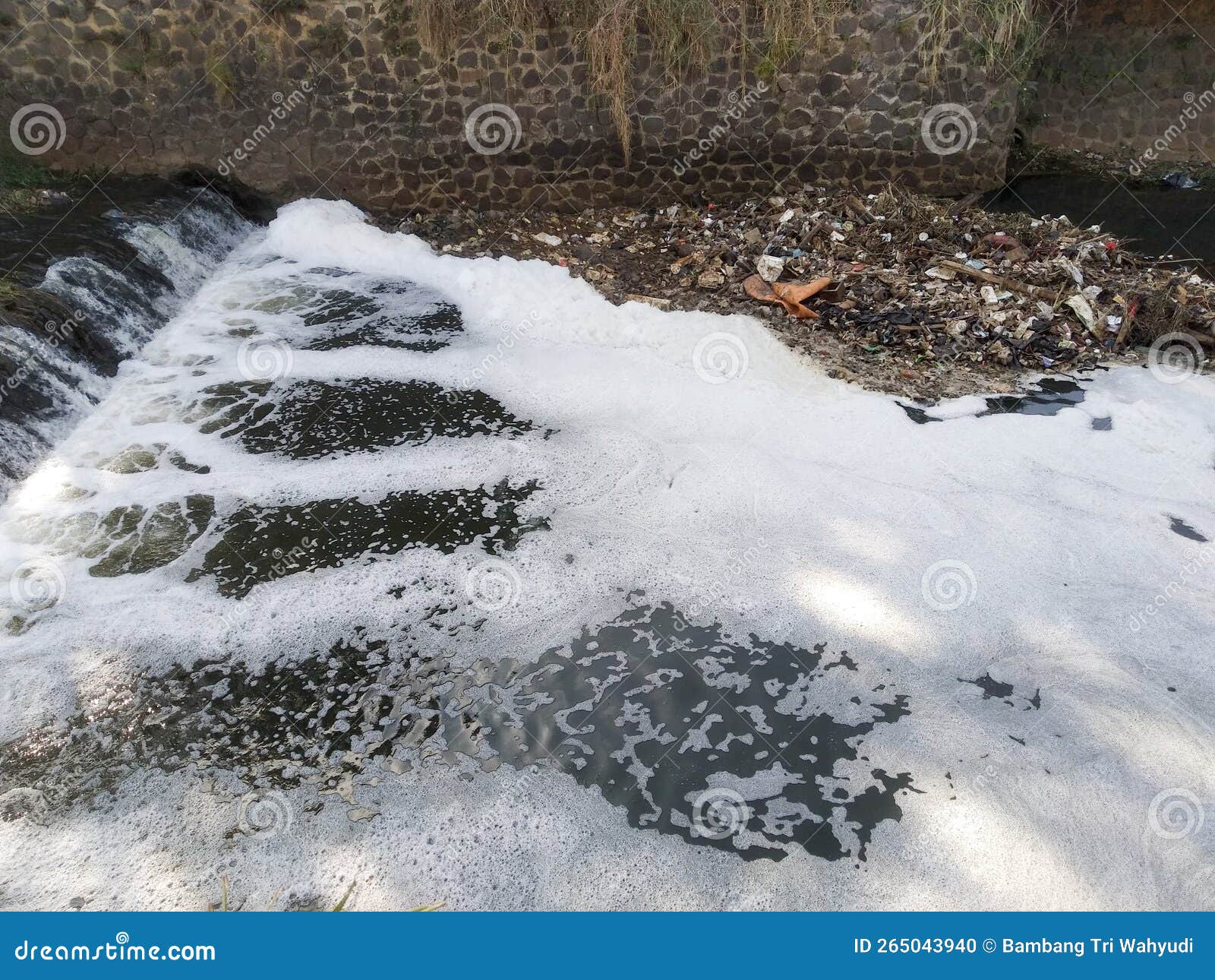 River foaming pollution stock photo. Image of river - 265043940