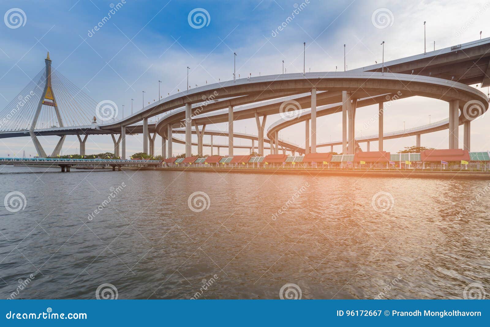 River Front Over Highway Intersection with Suspension Bridge Stock ...