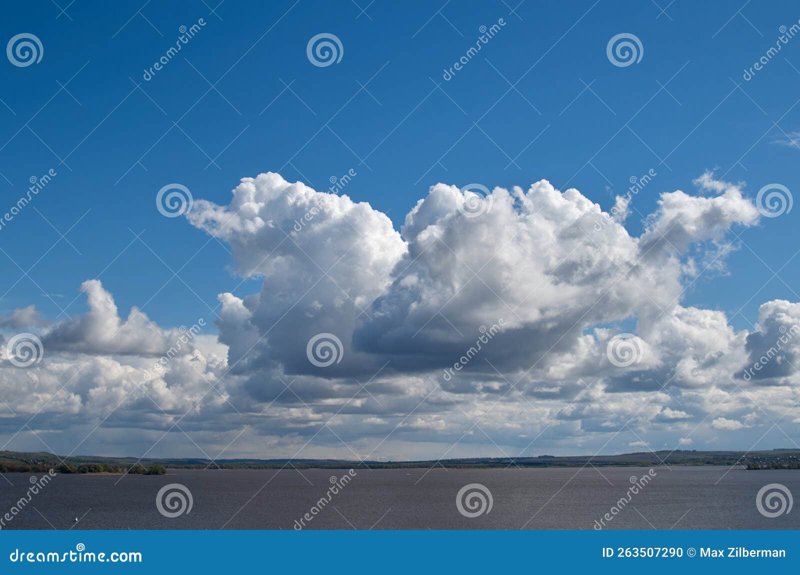 River Landscape with Cloudy Sky in the Background Stock Photo - Image ...