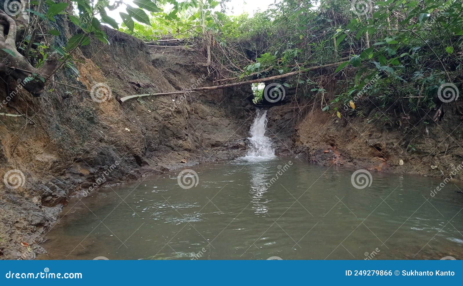 River with low waterfall stock photo. Image of creek - 249279866