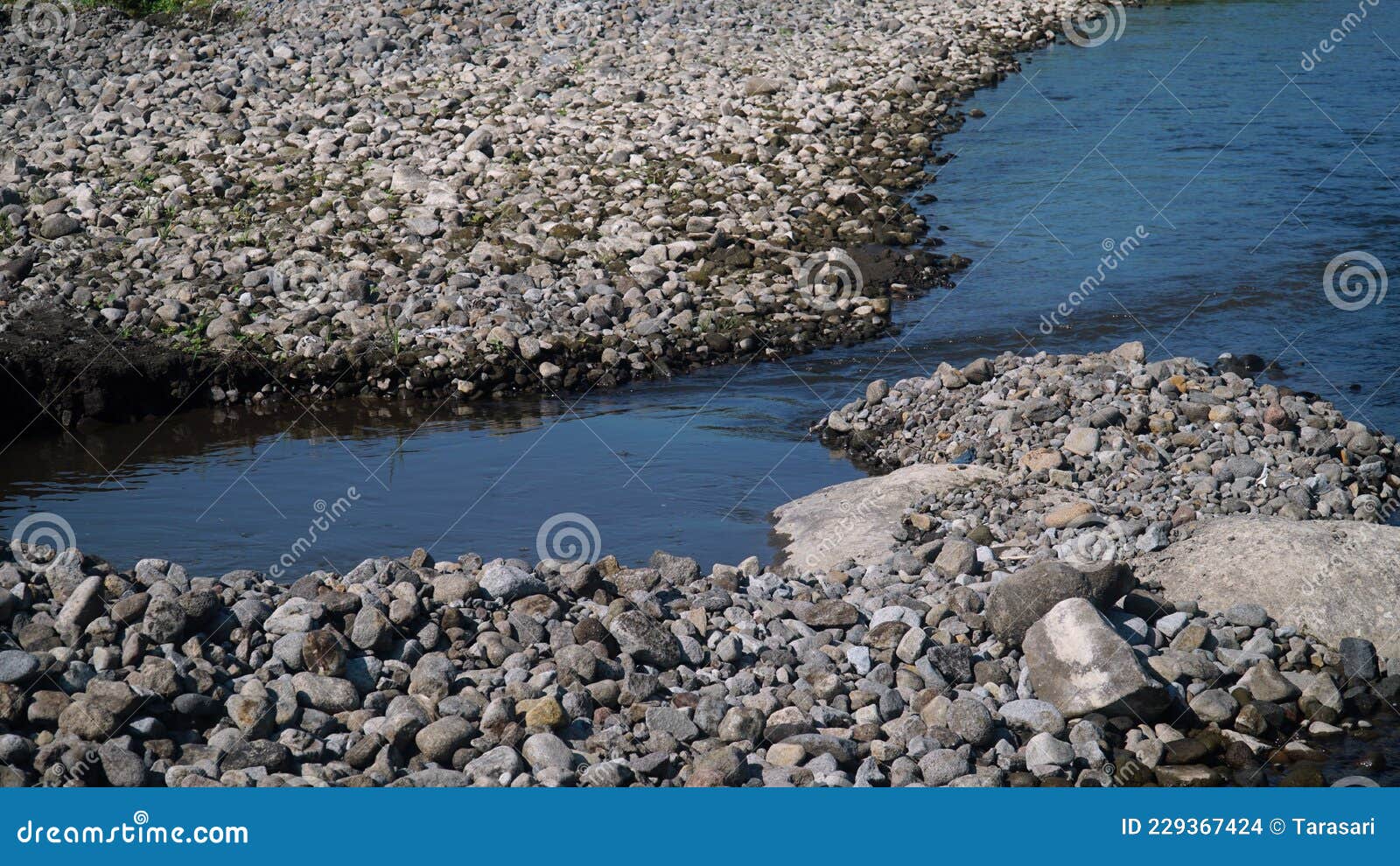 River with Many Stones and Pebbles on the River Bank Stock Photo ...