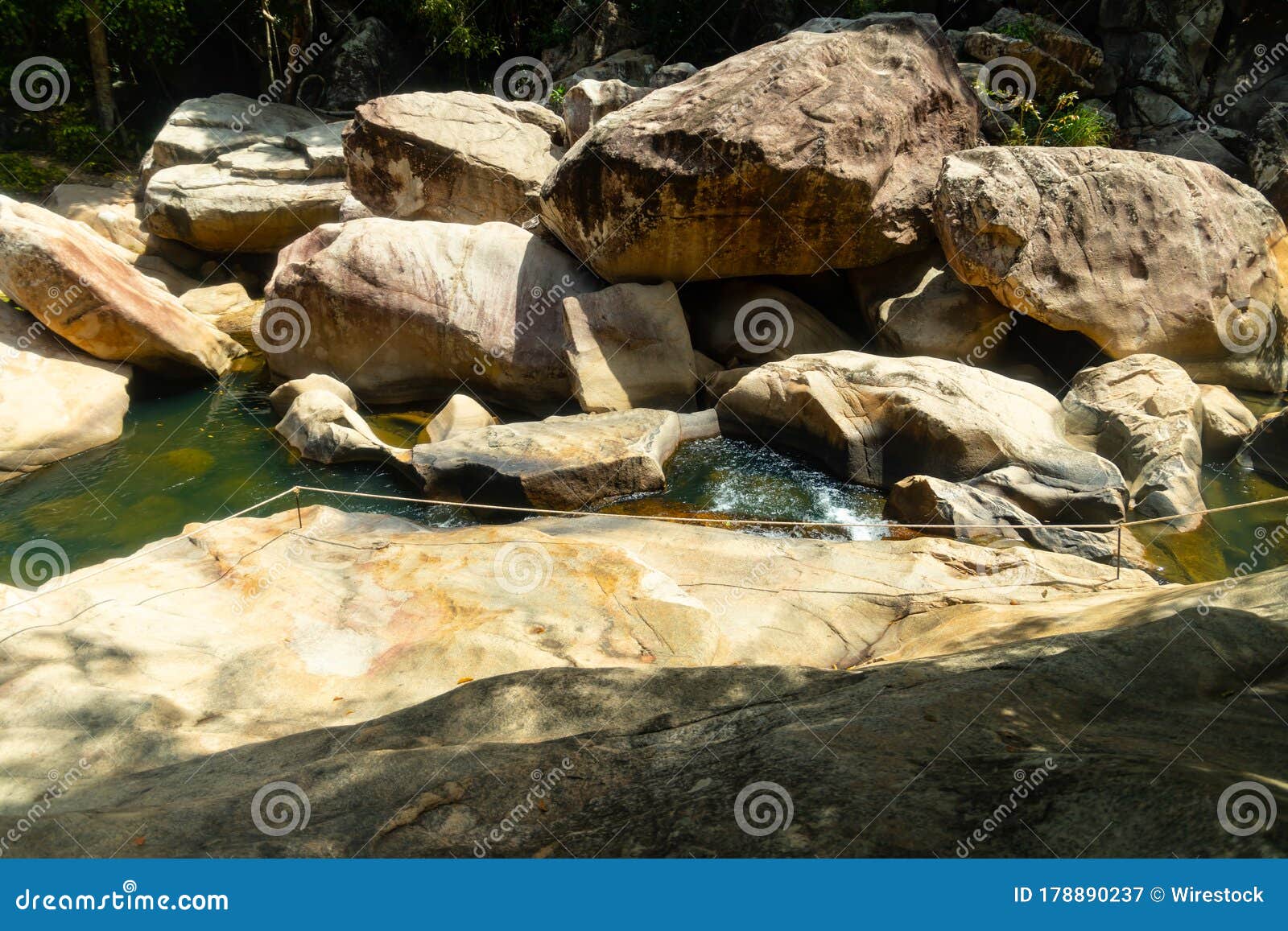 River in the Middle of Rocks at Ba Ho Waterfalls Cliff in Vietnam Stock ...