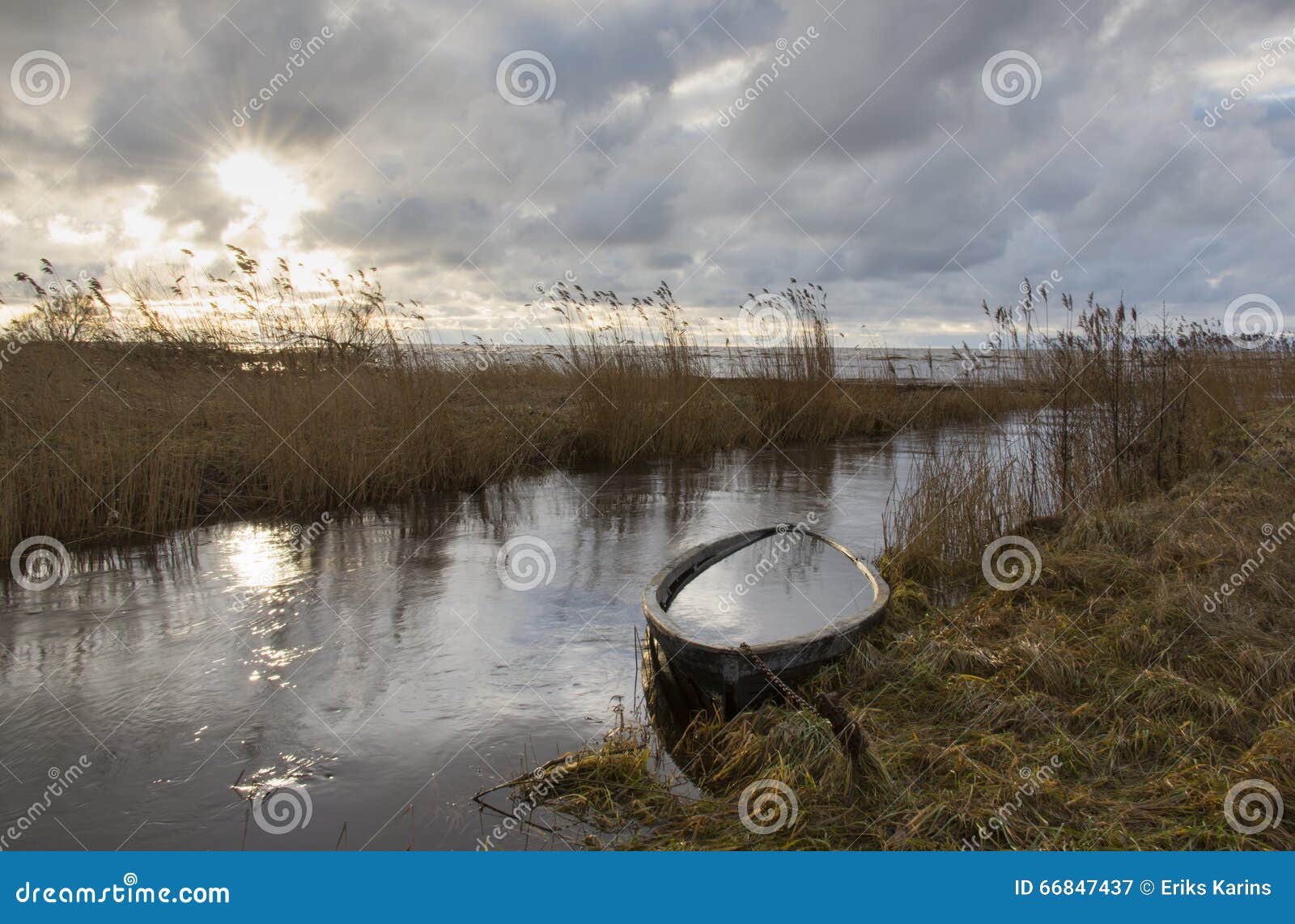 River Mouth with Sank Boat at Sunset Stock Image - Image of waves ...