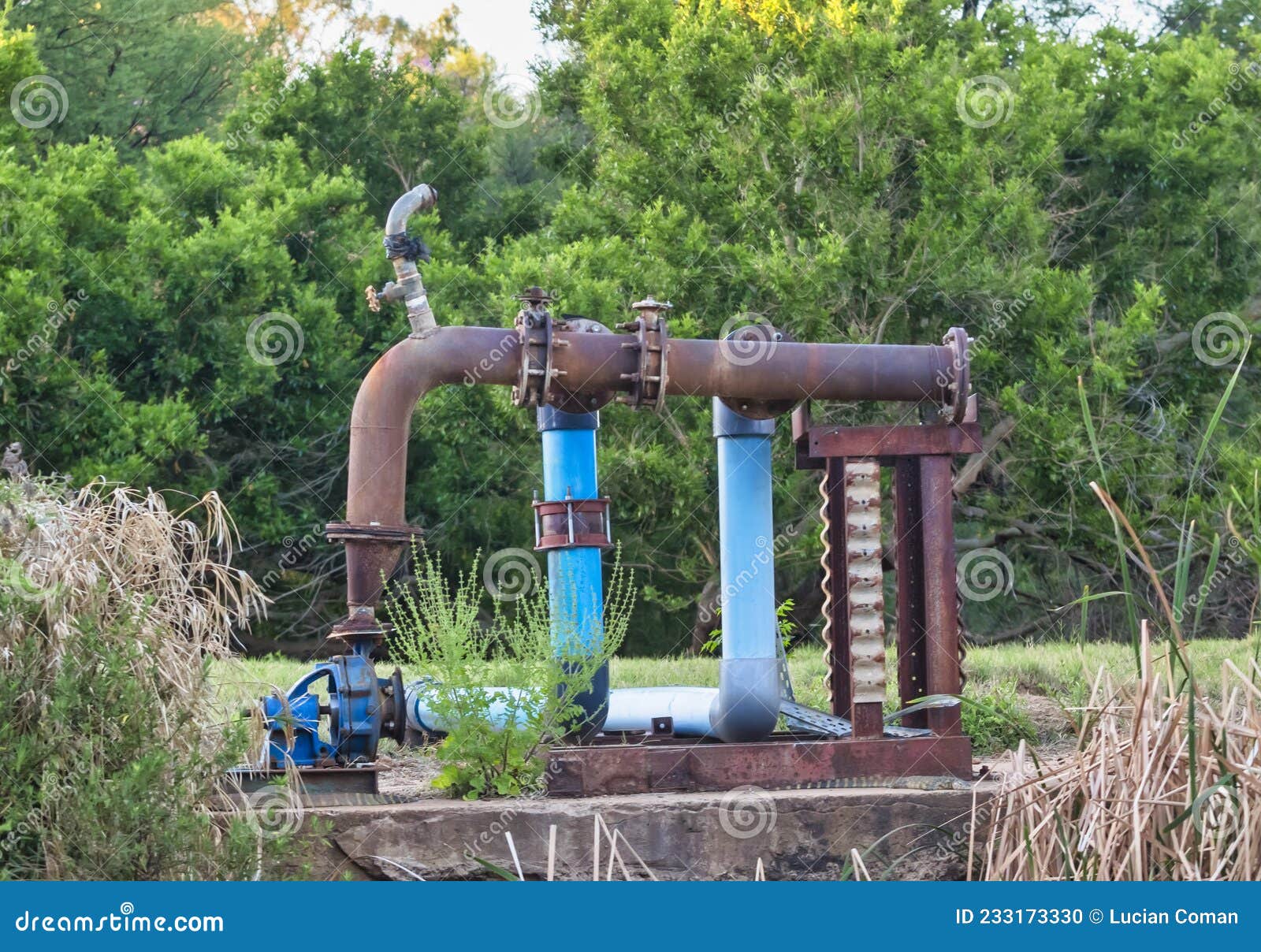 Water pump at the river stock photo. Image of outside - 233173330