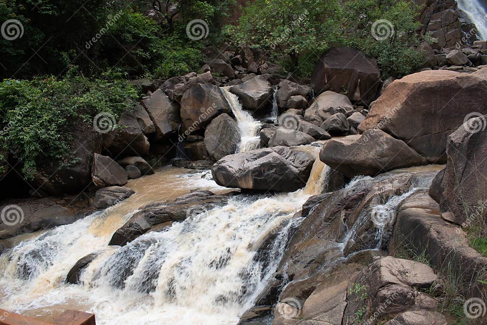 River Rapids through Large Boulders in the Wild Stock Image - Image of ...