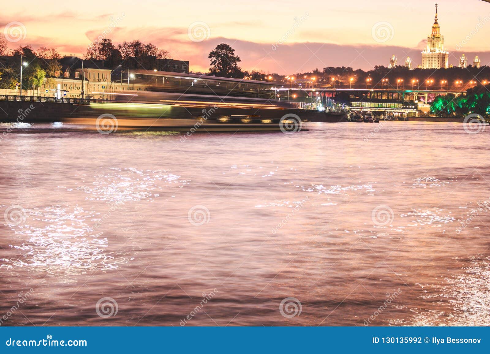 River with a Reflection of the Lights of the Night City. Stock Photo ...