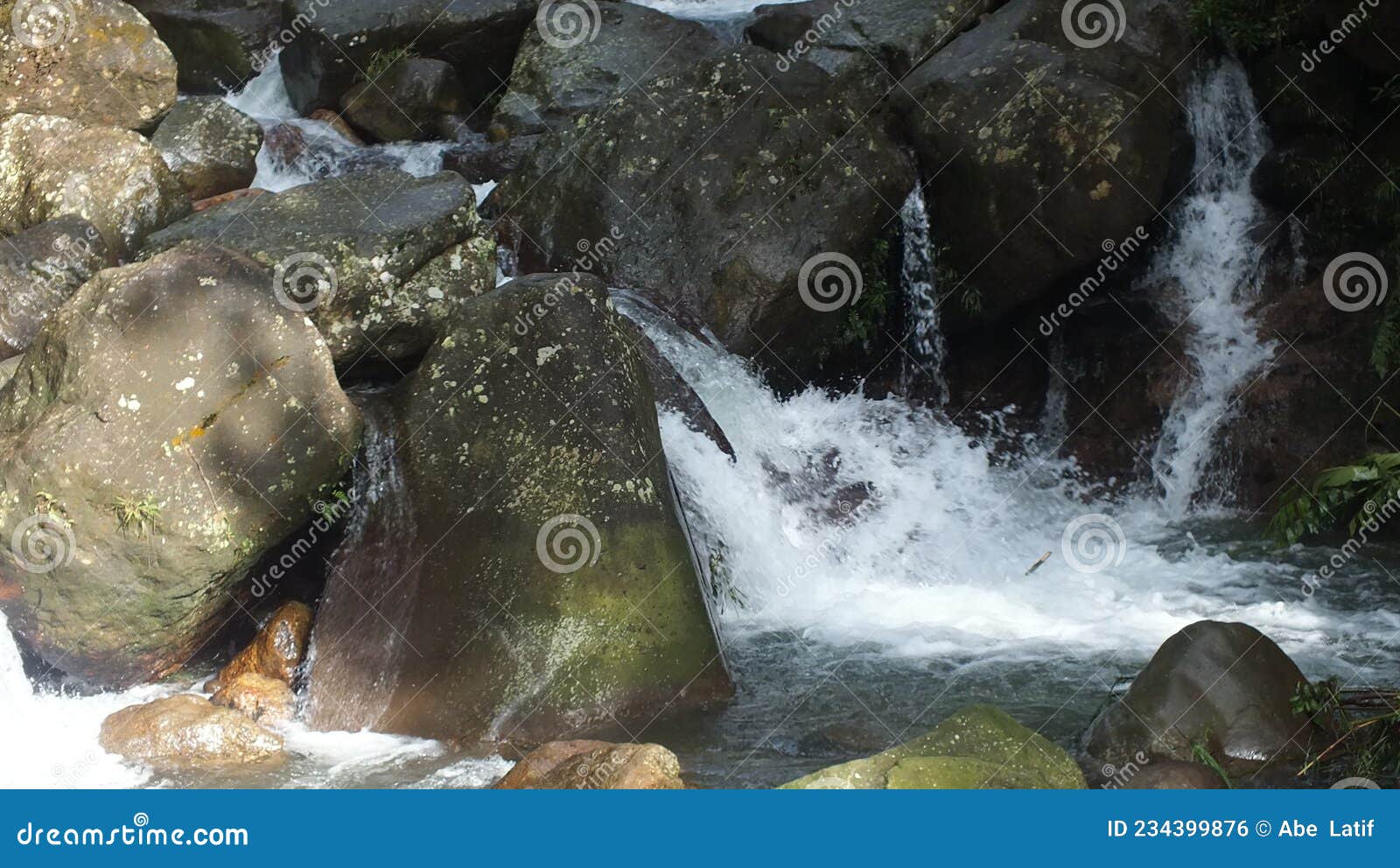 River Rock with Waterfall Background Stock Photo - Image of bright ...