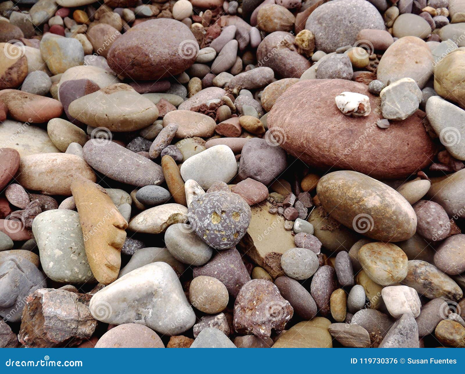 River Rocks of Different Sizes and Colors on the Side of the Road Stock ...