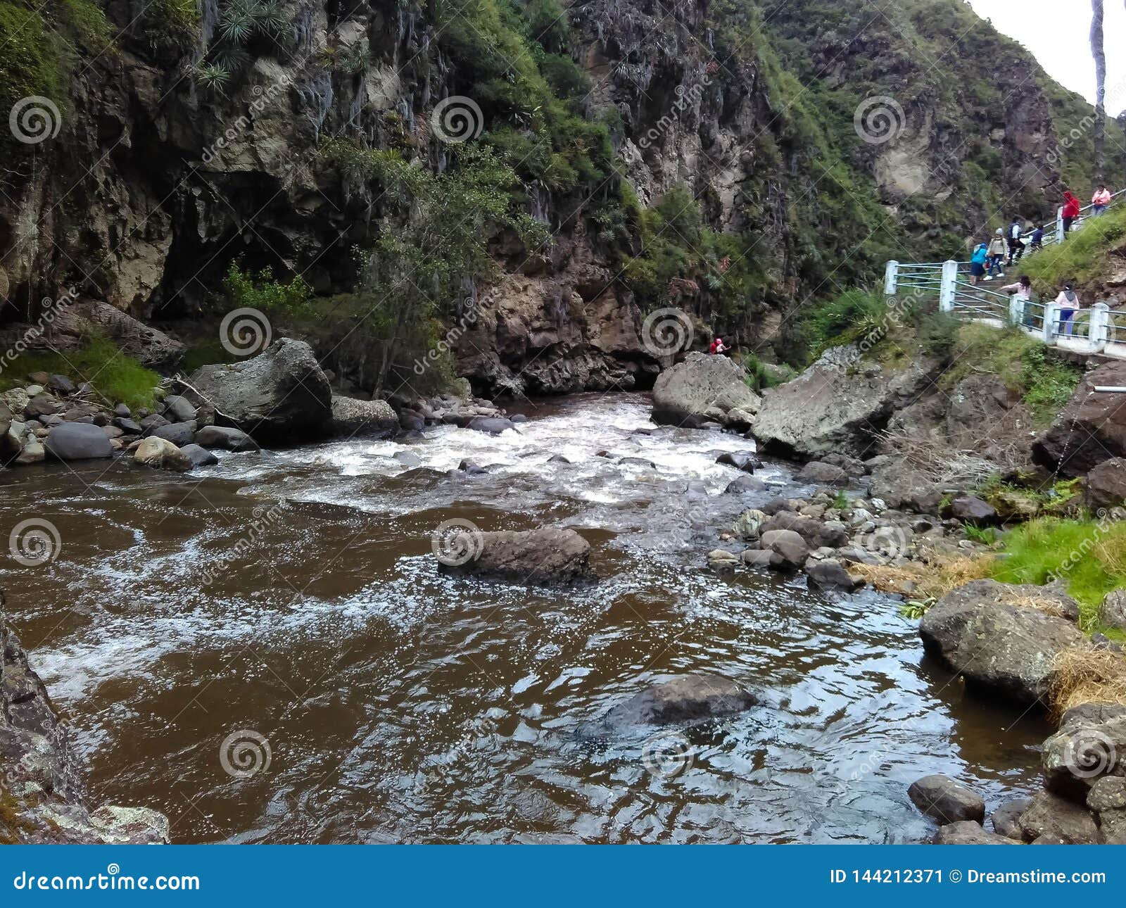 River Running in a Horizontal Direction with Rocks Surrounding it Stock ...