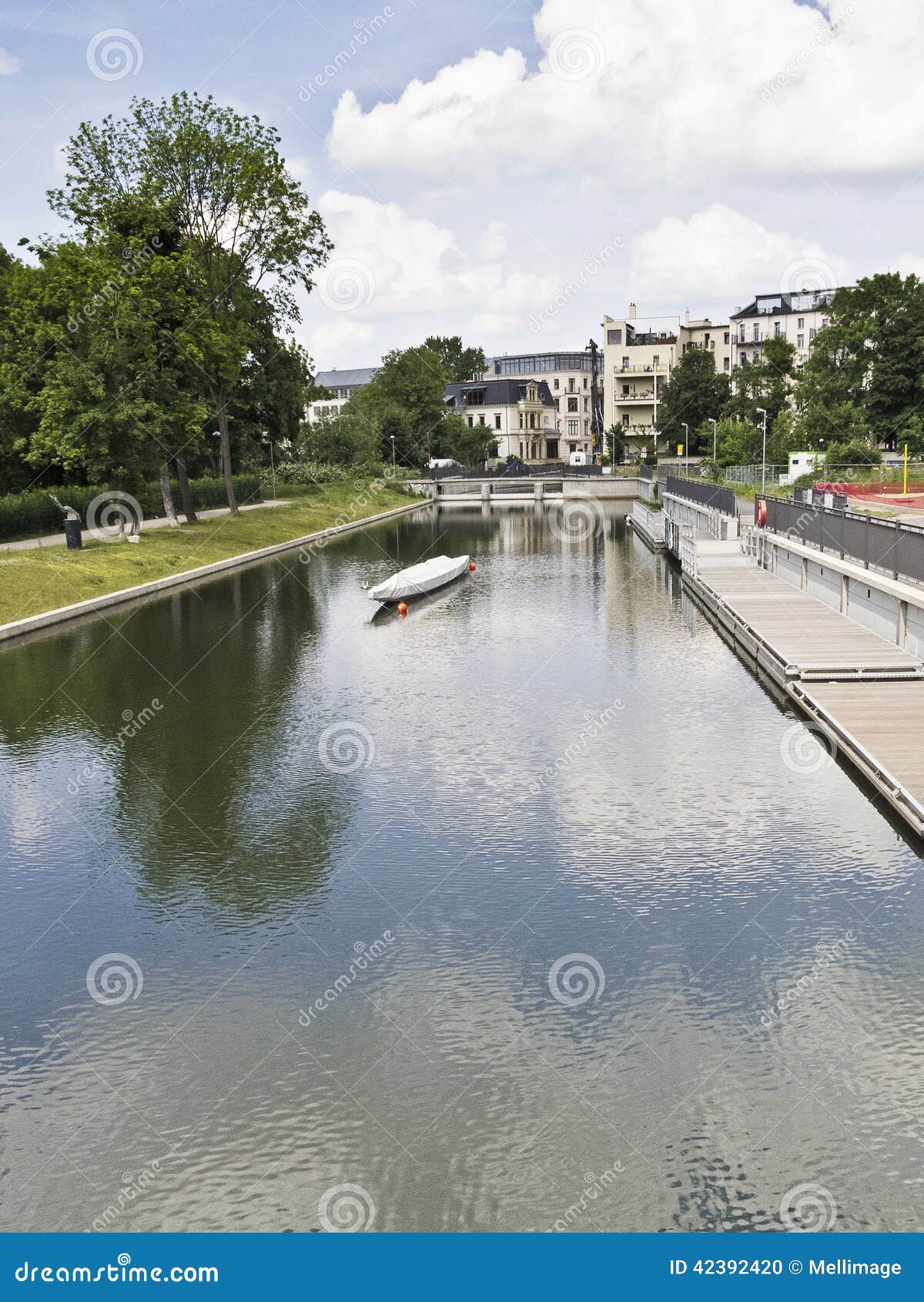 River runs through a city stock photo. Image of beach - 42392420