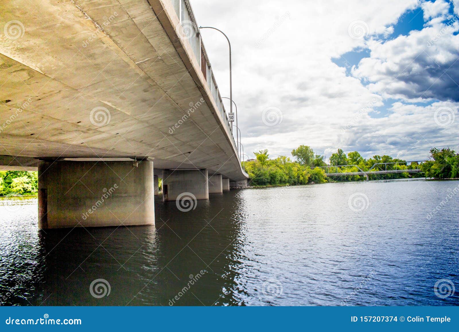 The River Runs Underneath the Bridge Stock Photo - Image of bridge ...