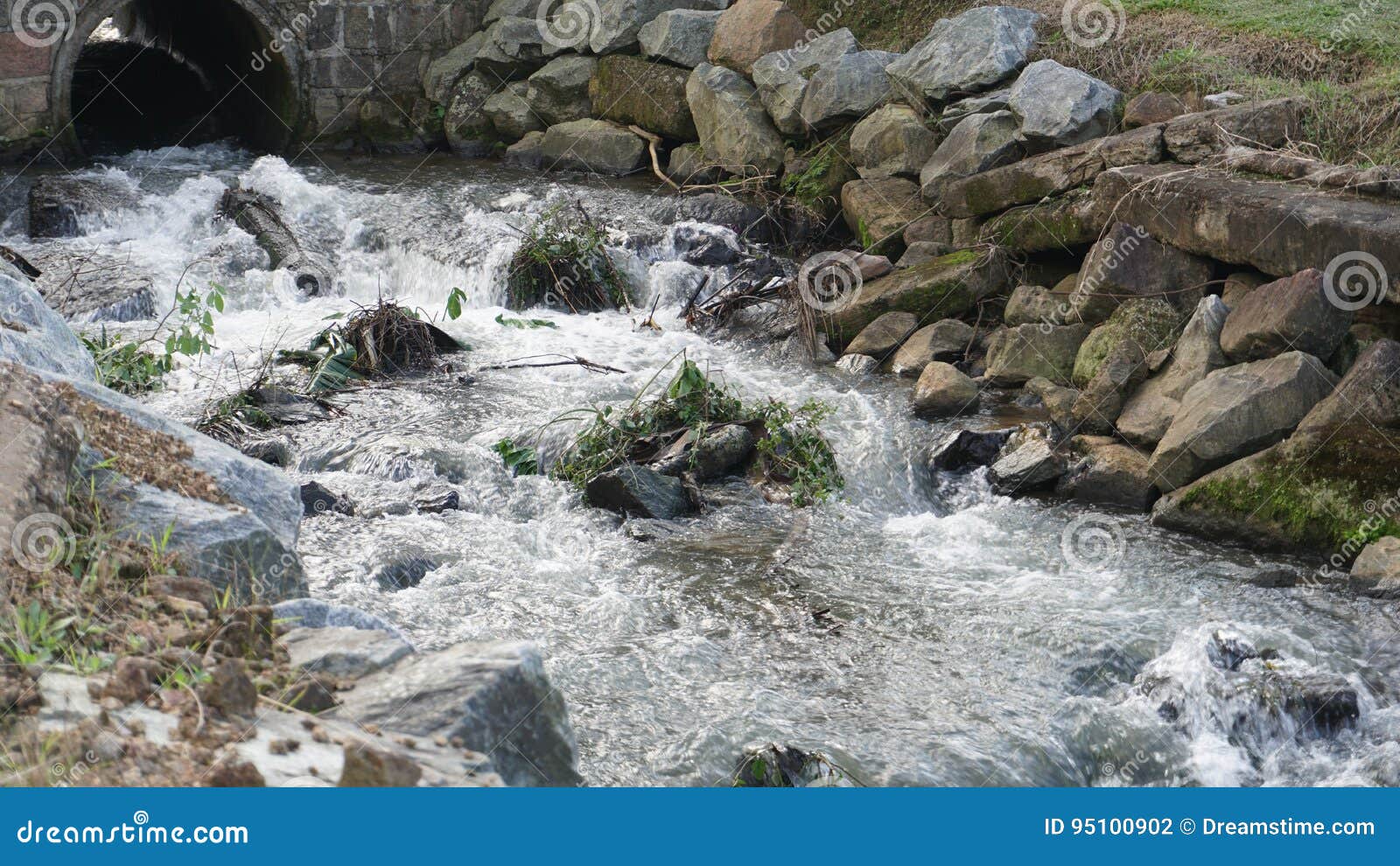 River with a stone slope stock photo. Image of stream - 95100902