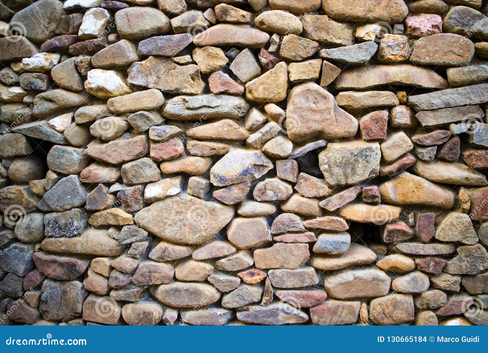 River stone wall stock photo. Image of design, textured - 130665184