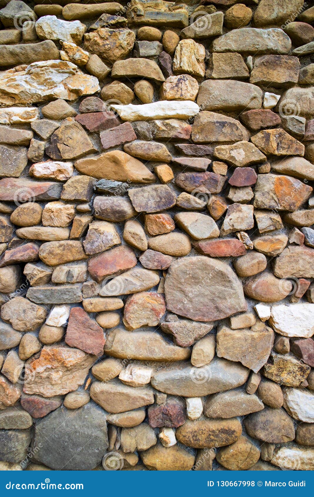 River stone wall stock photo. Image of shape, surface - 130667998