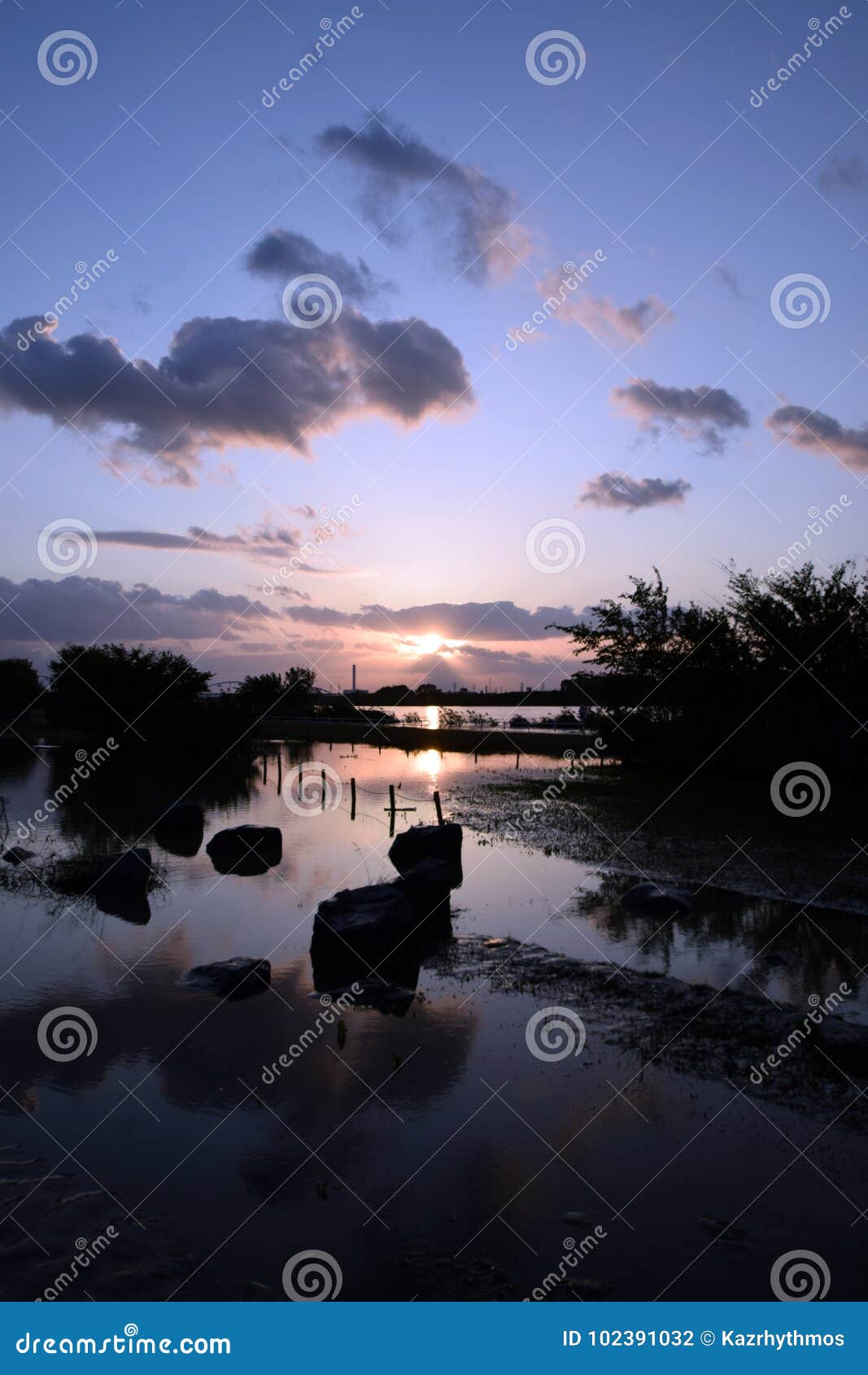 River and the Sunset after the Typhoon. Stock Photo - Image of flood ...