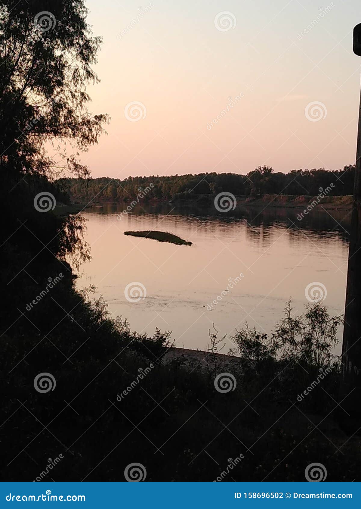 The River Sure is Low but that Sunset is Perfect Stock Photo - Image of ...