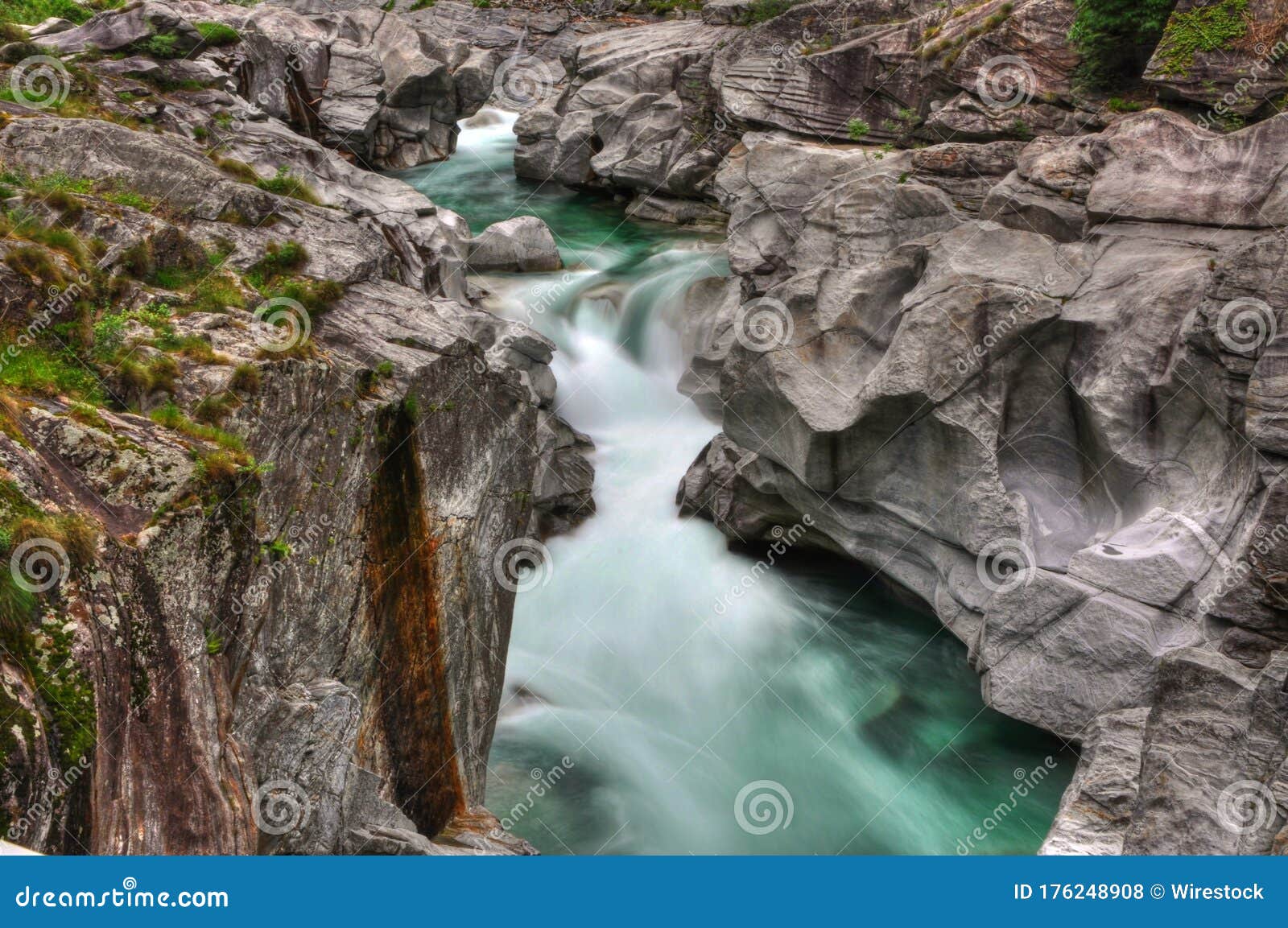 River Surrounded by Rocks Covered in Mosses in the Valle Verzasca in ...