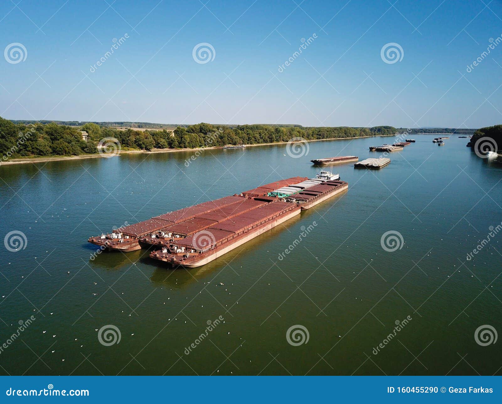 River Traffic by Cargo Ships in the Danube Stock Photo - Image of ship ...