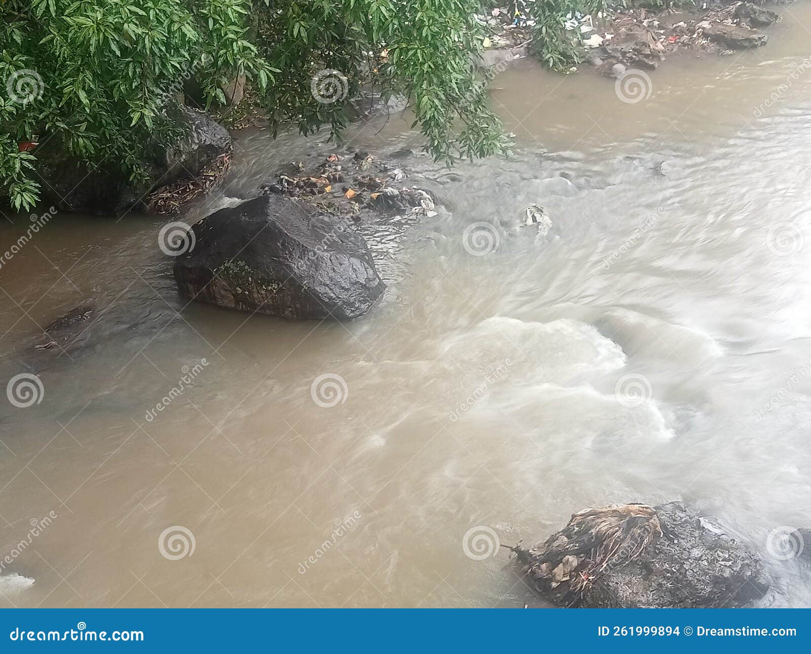 The River with Turbid Water is Being Attacked by the Sky with Raindrops ...